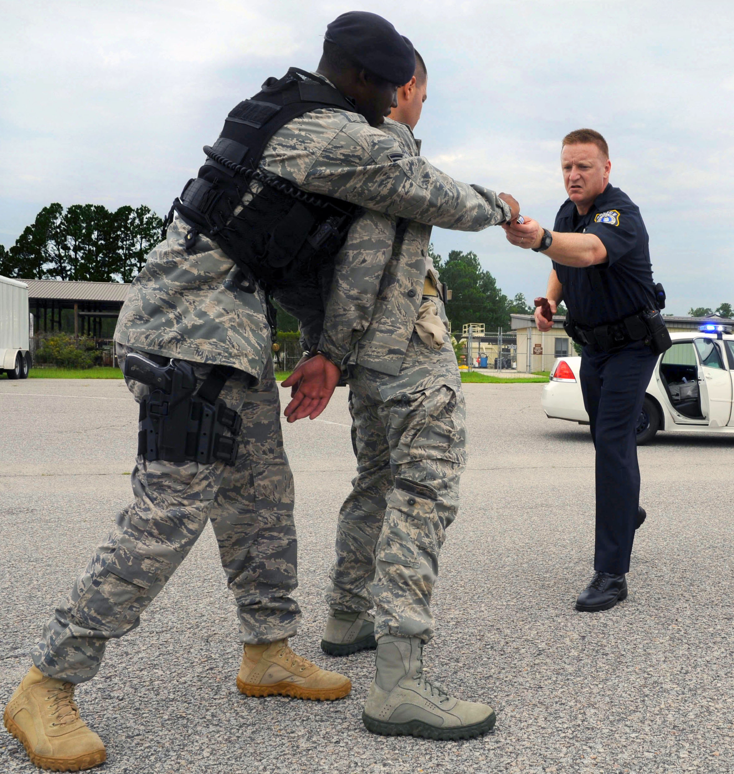 Photos: Patrolmen in pursuit take down gate runner during exercise ...