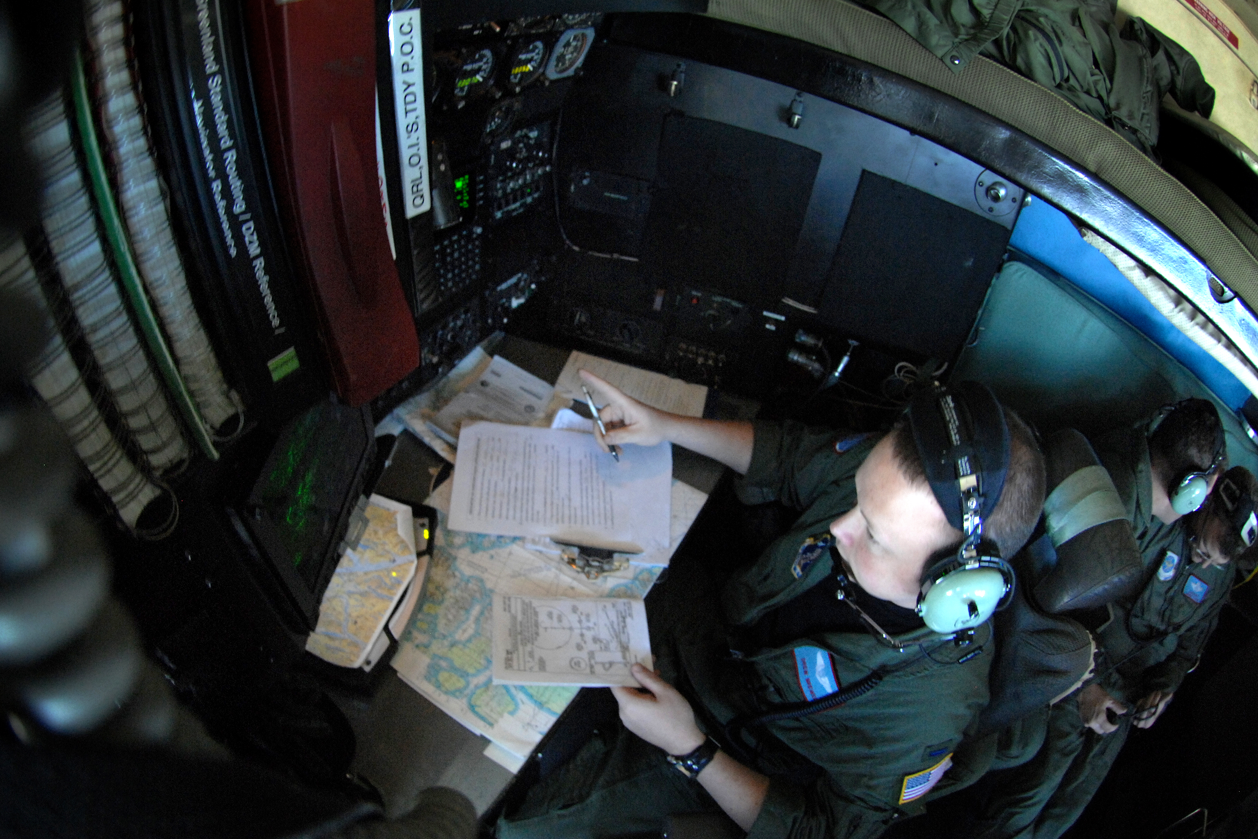 U.S. Air Force 1st Lt. Drew Brewer navigates the skies over Greenland ...
