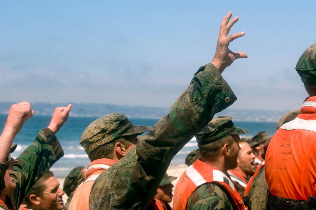 Members of Class 284 at the Naval Special Warfare Center cheer as ...