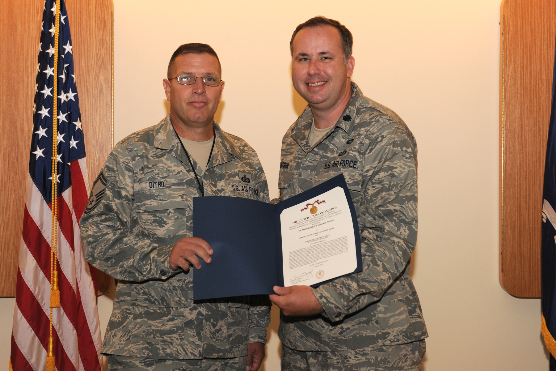Senior Master Sgt. John Ditro receives the Meritorious Service Medal