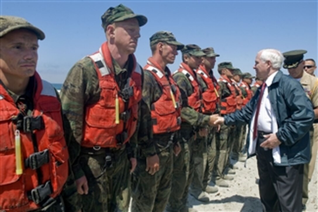 Secretary Gates shakes hands with Class 284 at the Naval Special ...