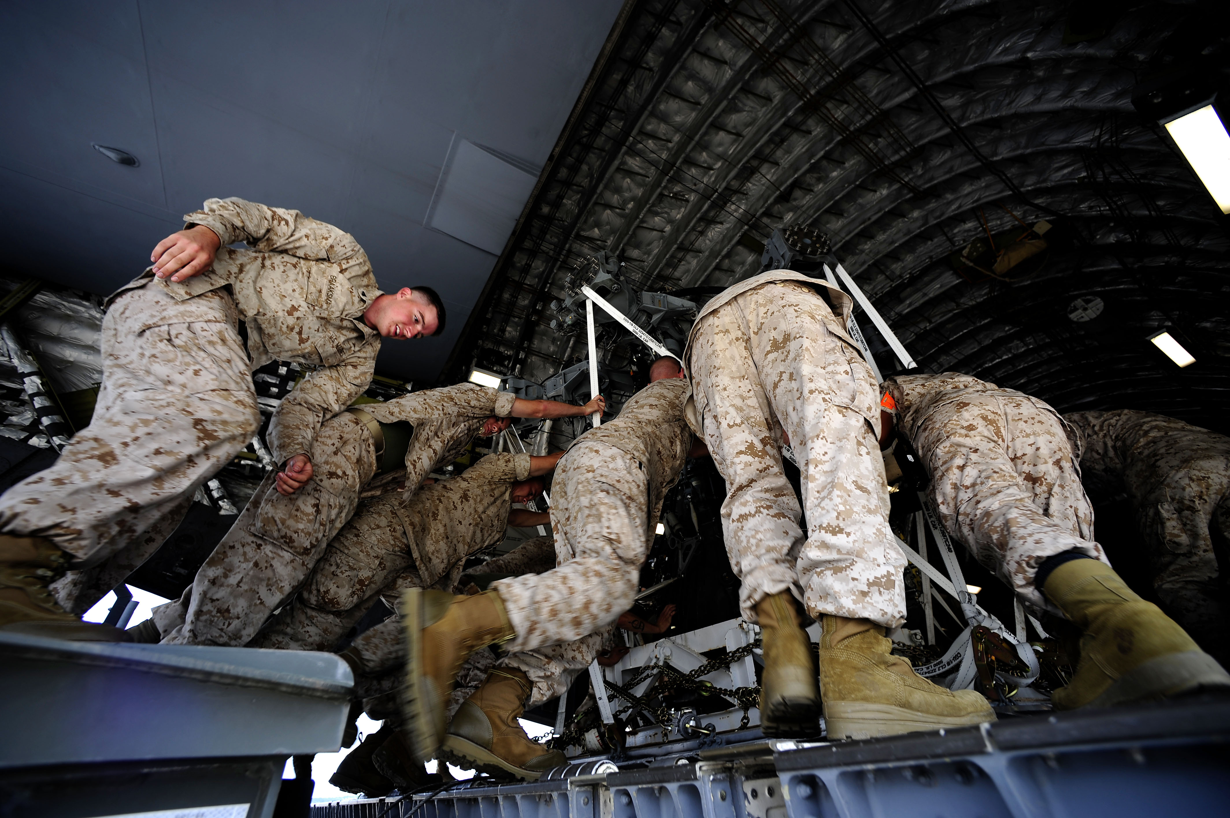 PHOTOS: AMC Airmen partner with U.S. Marines to bring aid to Pakistan ...