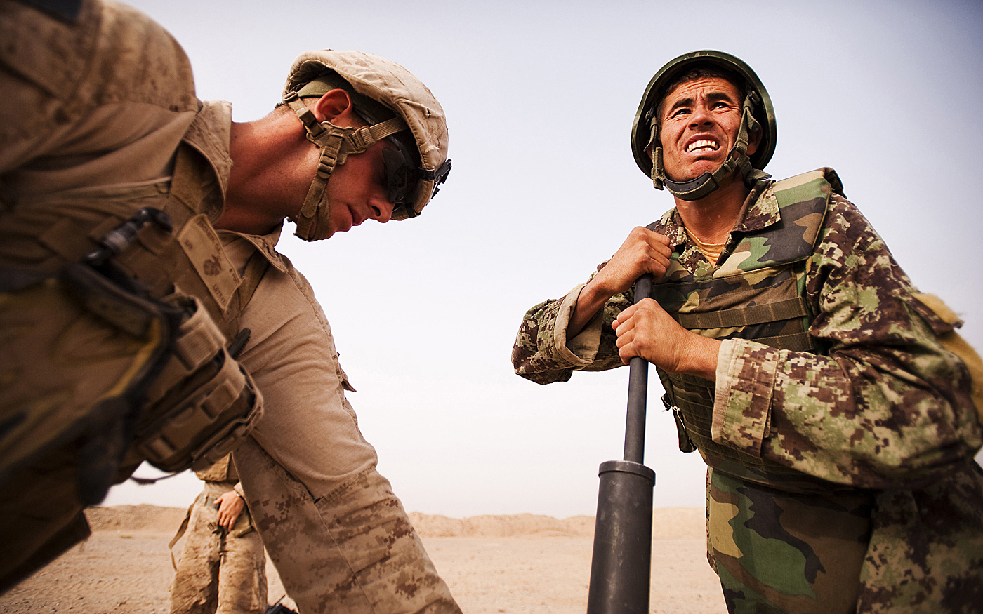 U.S. Marine Corps Lance Cpl. Cletus L. Eicher and Din Mohamad, an ...