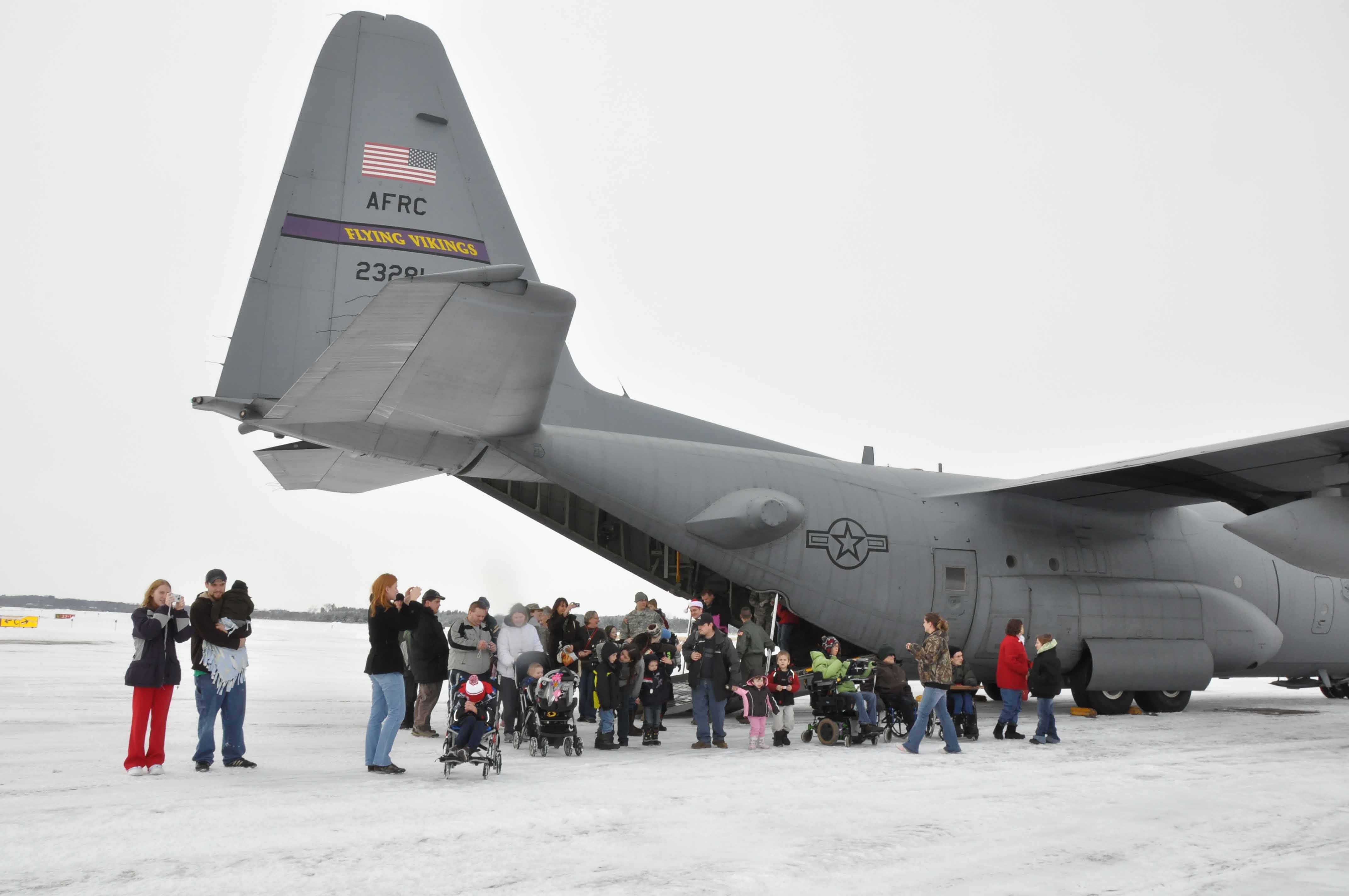 934th airlift wing members lift spirits during Operation Santa ...