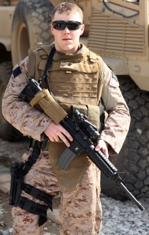 Marine Corps Cpl. Bryan Lett prepares for a patrol during his ...