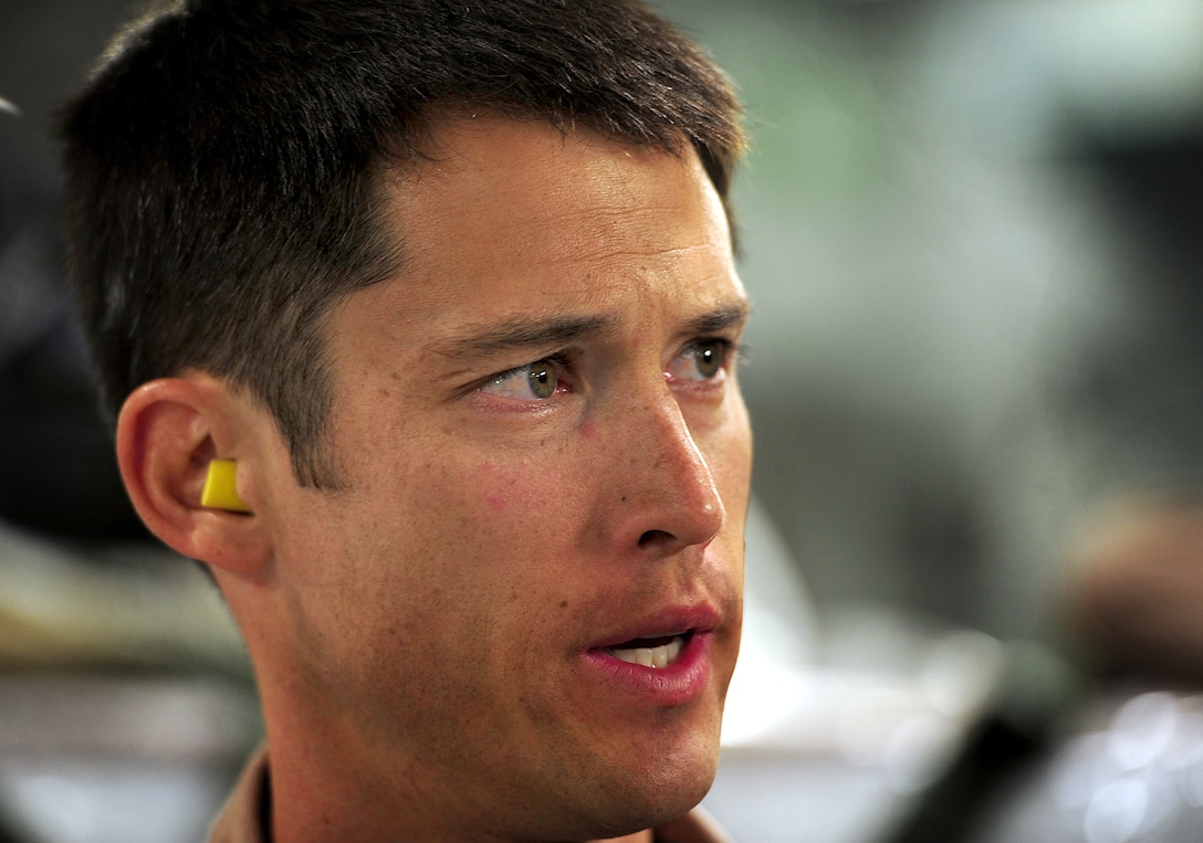 U.S. Air Force Capt. Michael Masuda, a Globemaster III pilot assigned ...
