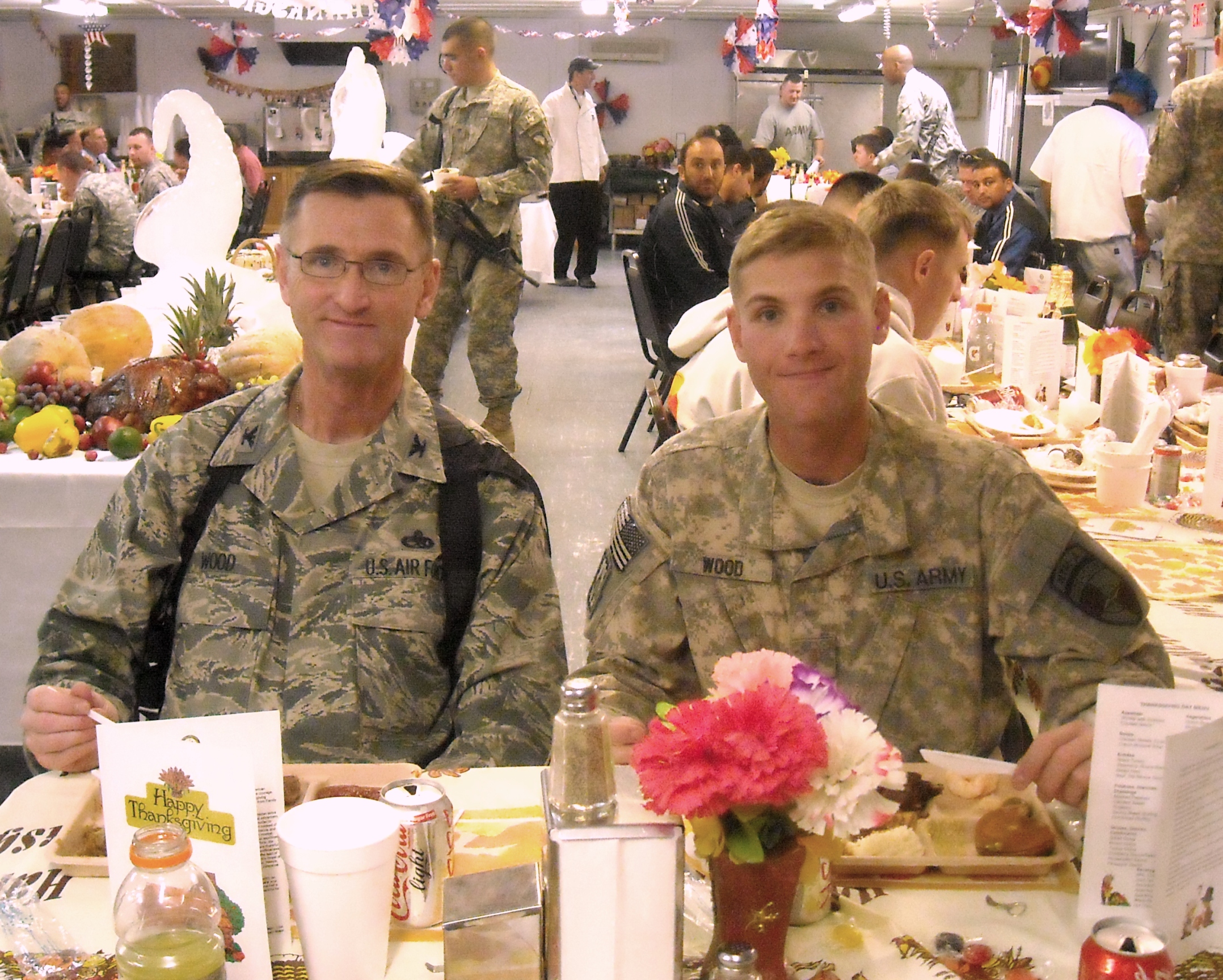 AF colonel promotes Army son in Afghanistan