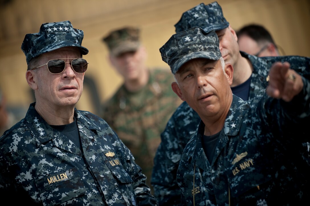 U.S. Navy Rear Adm. Samuel Perez, right, commander of Task Force 42 ...
