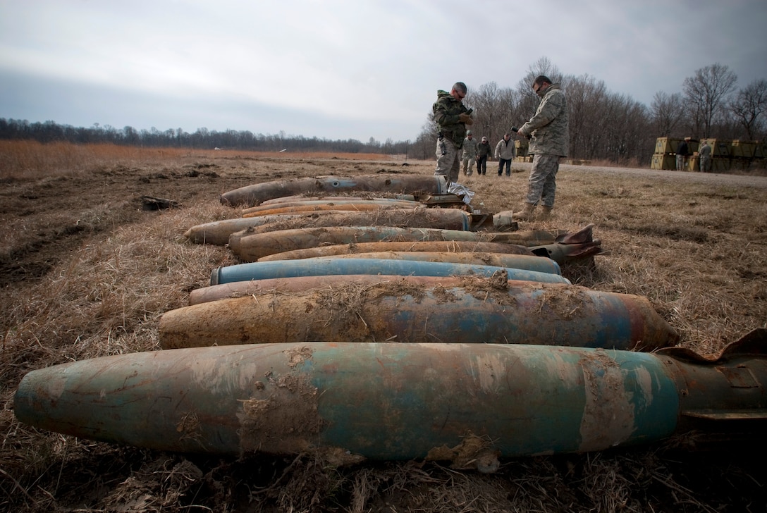 Airmen prepare C-4 plastic explosives for EOD