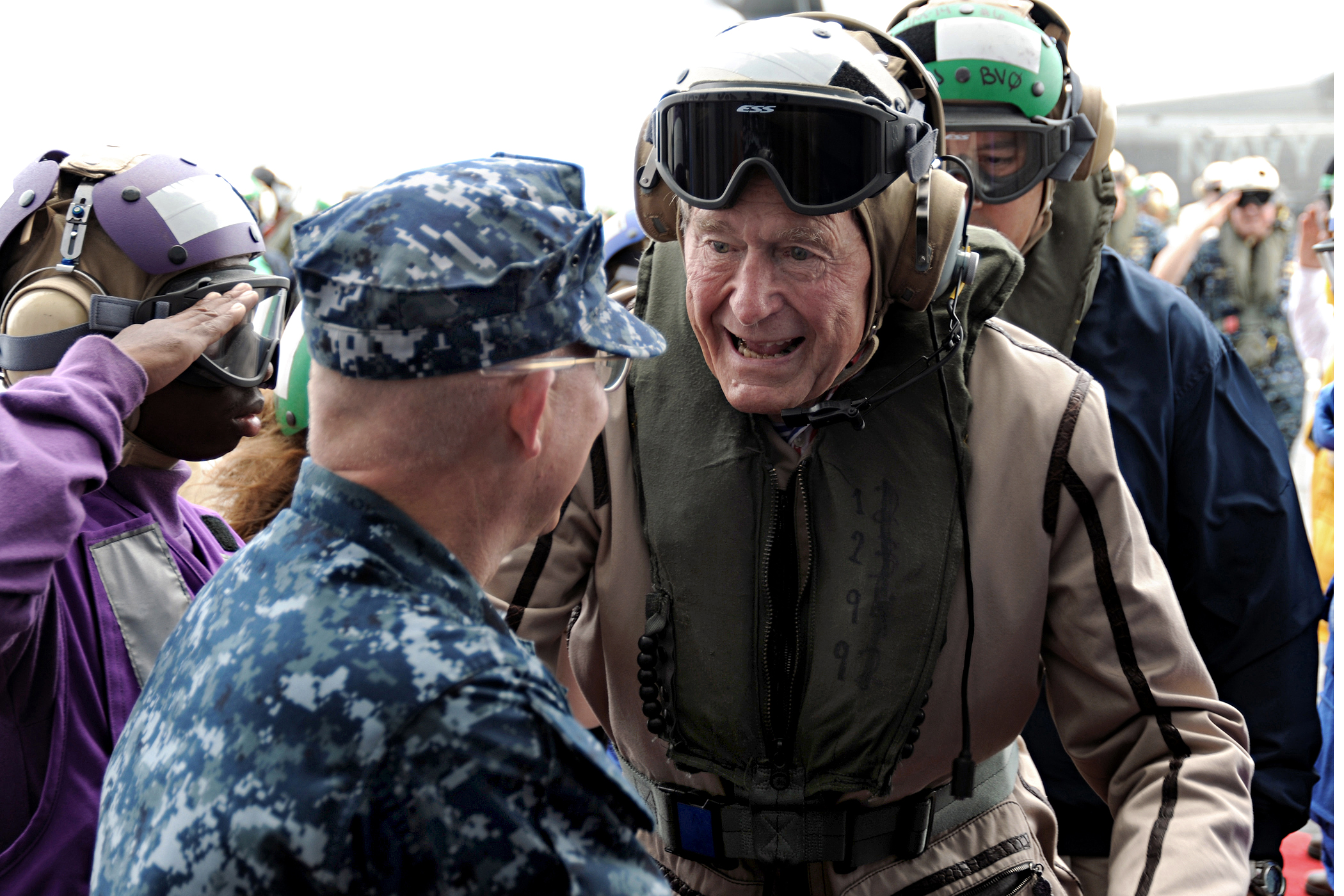 Former President George H.W. Bush greets Navy Capt. Chip Miller ...