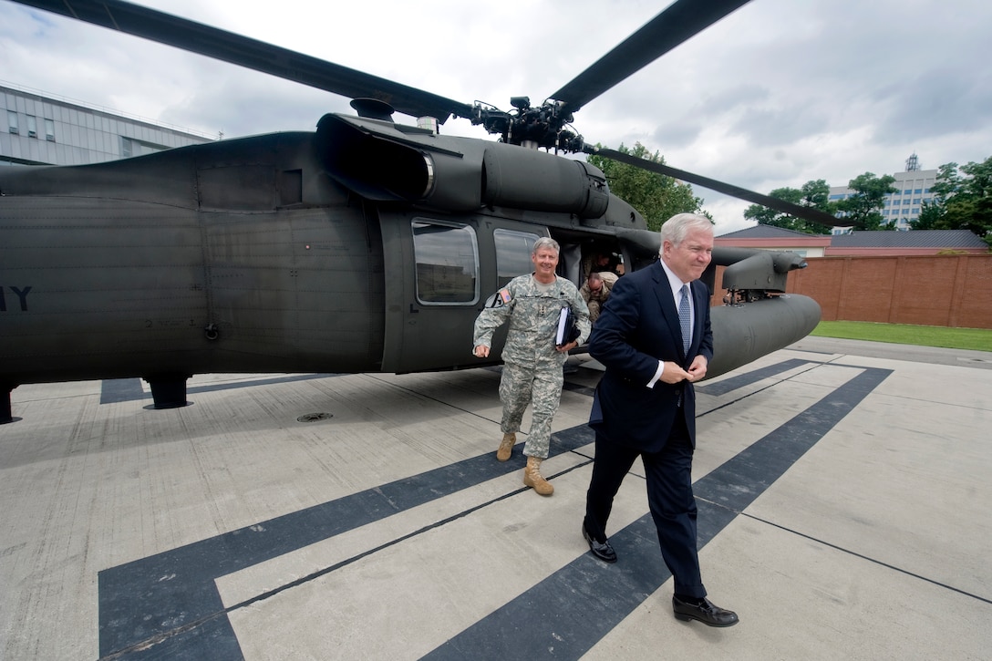 U.S. Defense Secretary Robert M. Gates and Army Gen. Walter L. "Skip ...