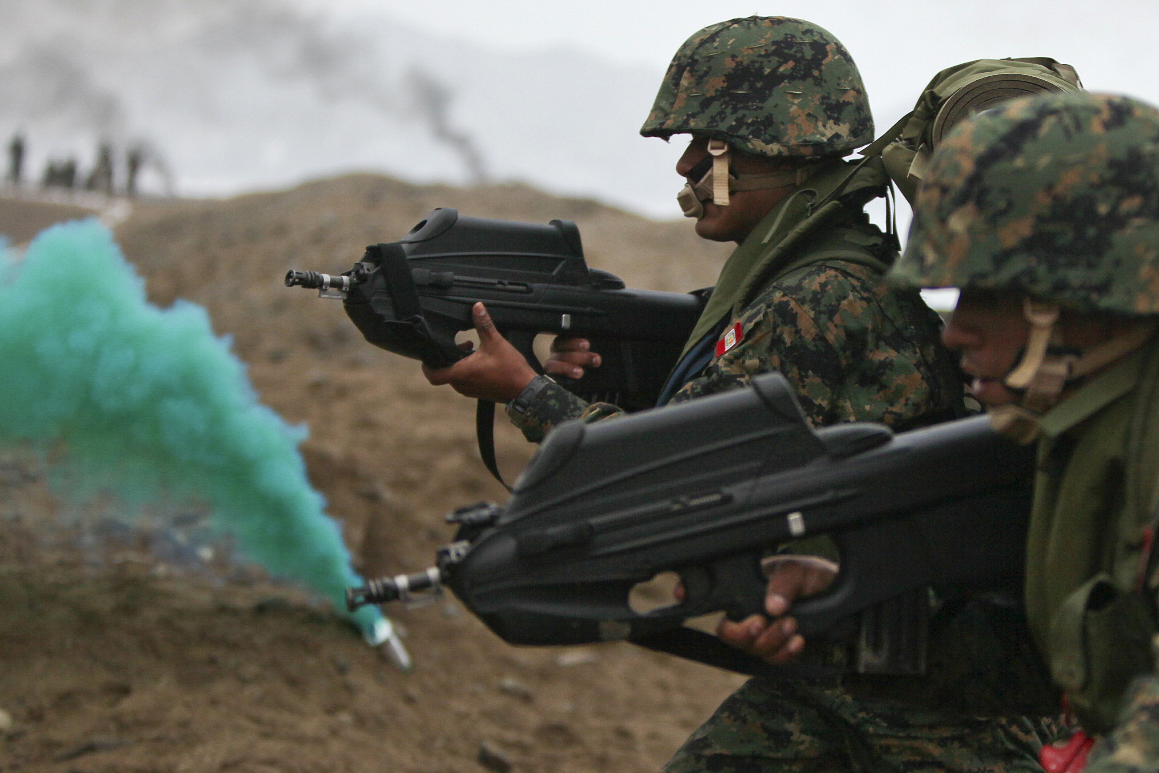 Peruvian marines carry F2000 assault rifles during a Partnership of the ...