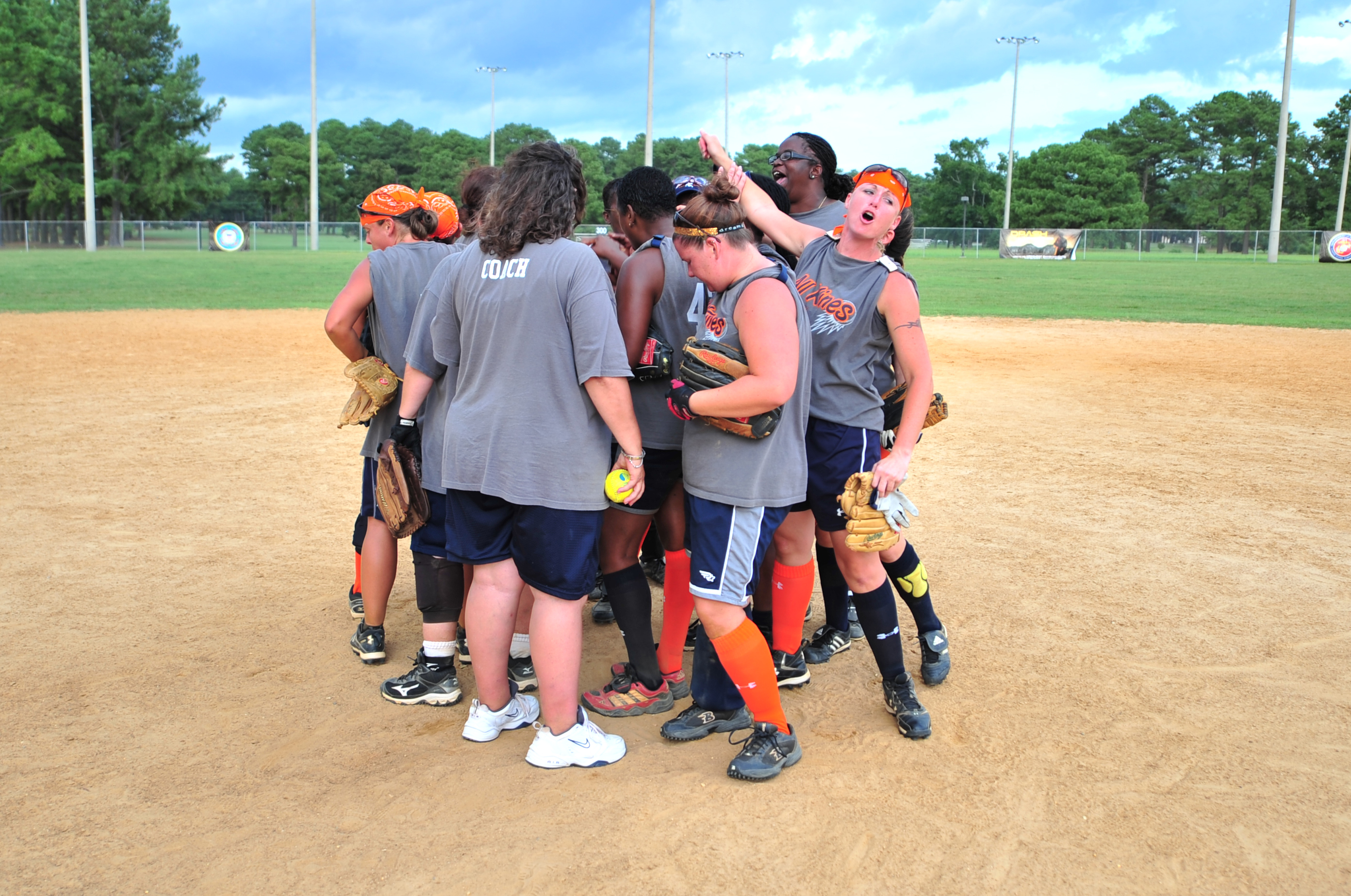 Sister-service compete in softball tournament