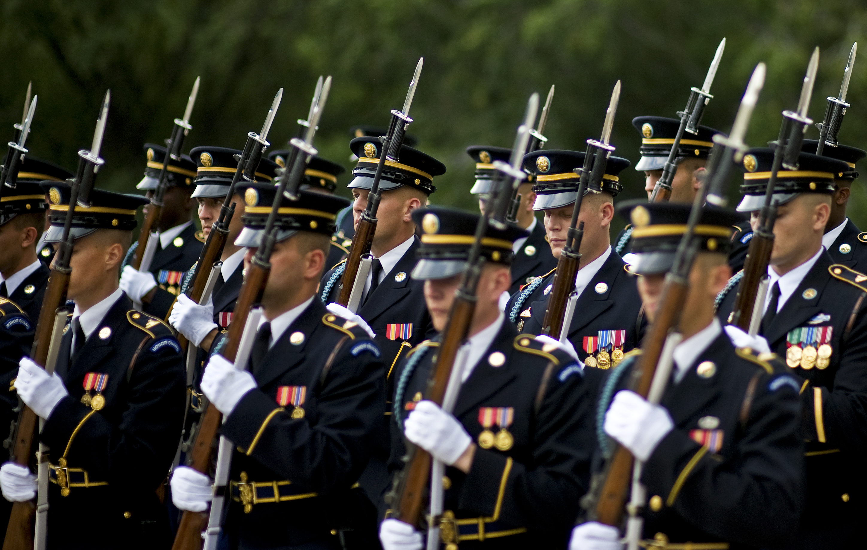 Soldiers with The Old Guard, 3rd U.S. Infantry Regiment, stand at the ...