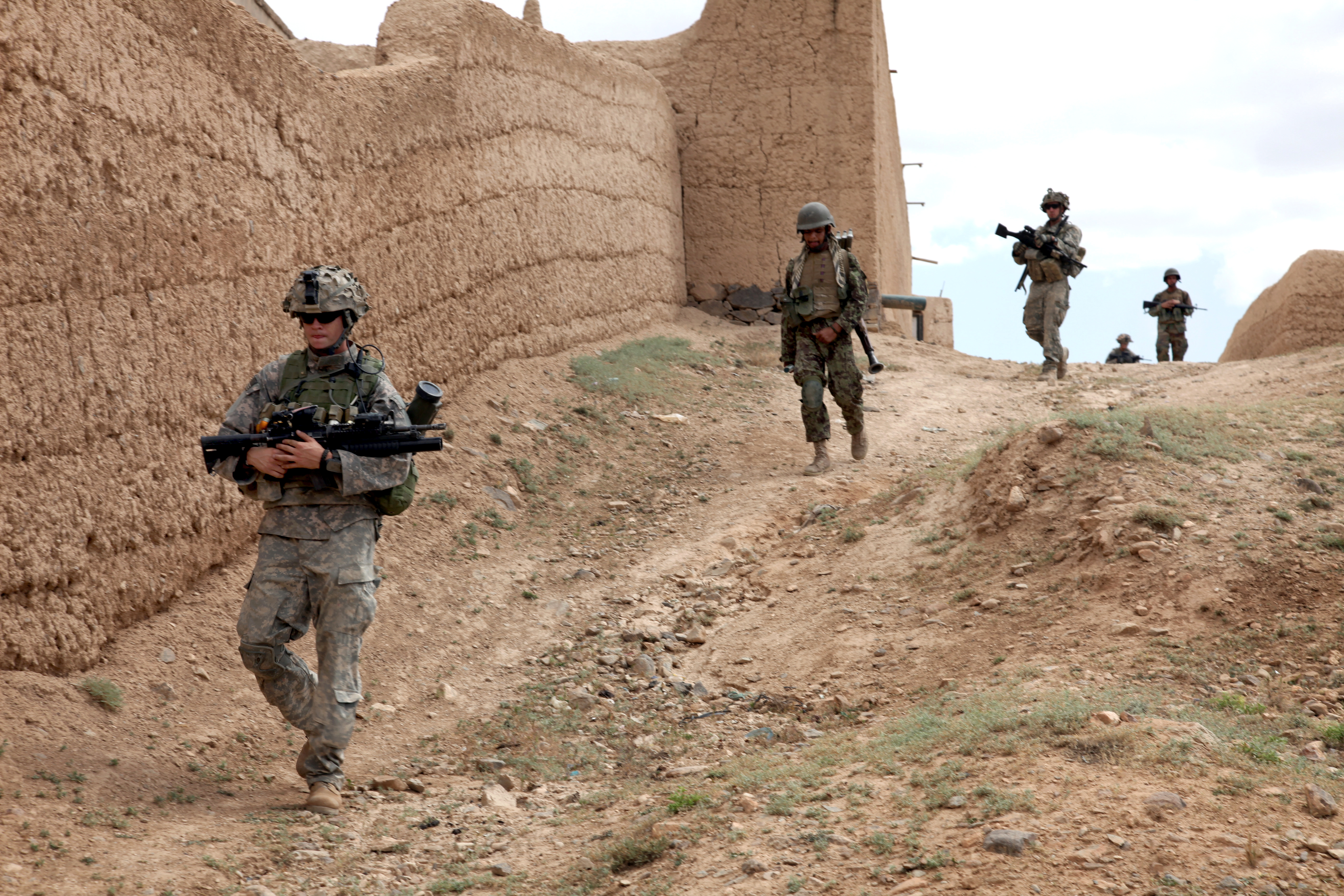 U.S. Army cavalrymen and Afghan National Army soldiers conduct a ...