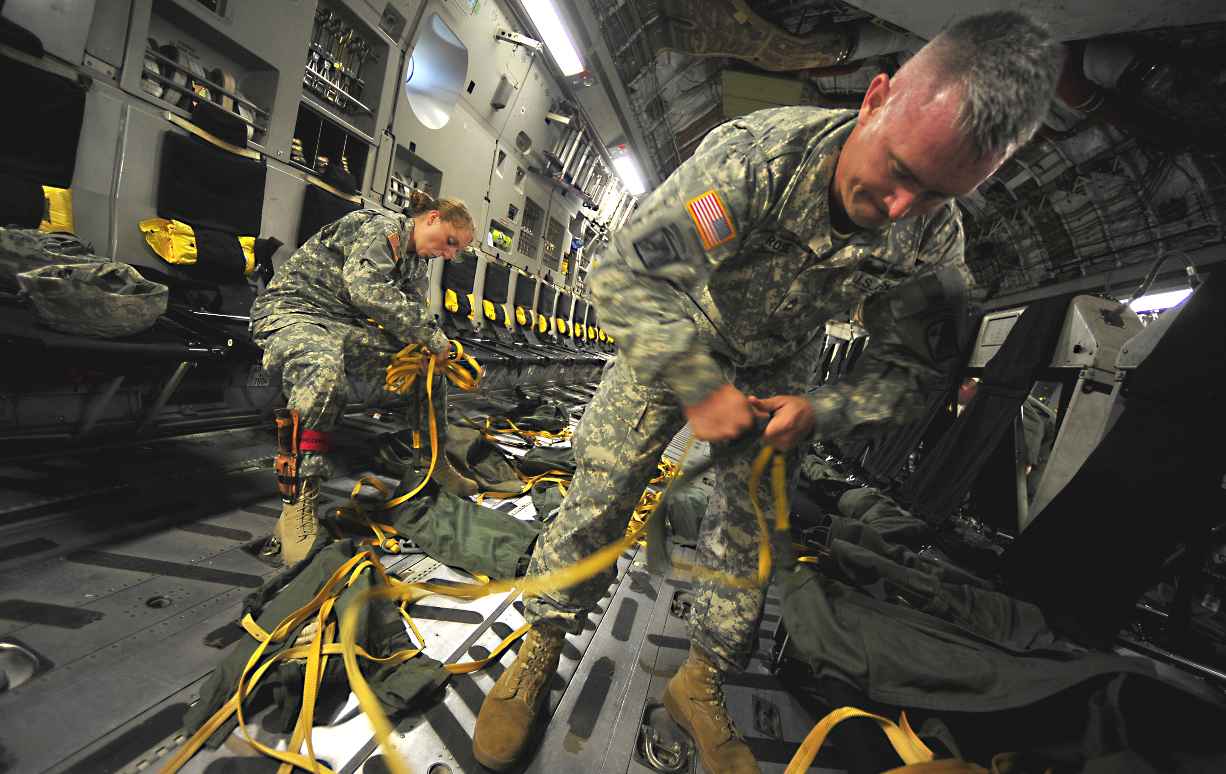 U.S. Army Staff Sgt. Jennifer Brockmoller, left, and Sgt. 1st Class Nicholas Rose, both with the ...