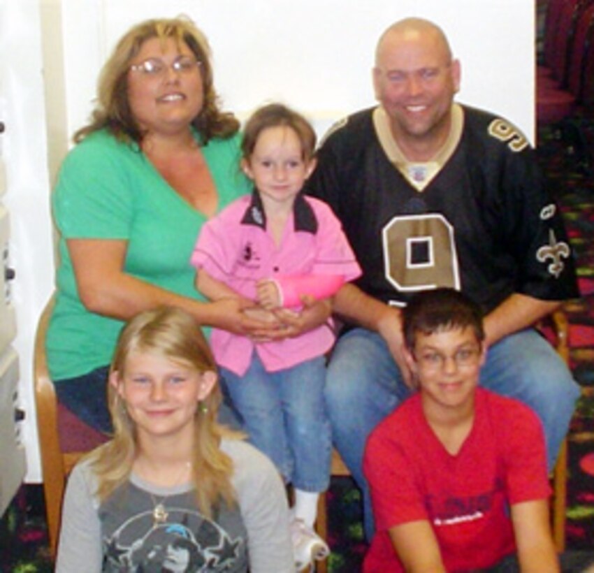 Air Force Master Sgt. Kipp M. Bourgeois and his wife, Christina, pose ...