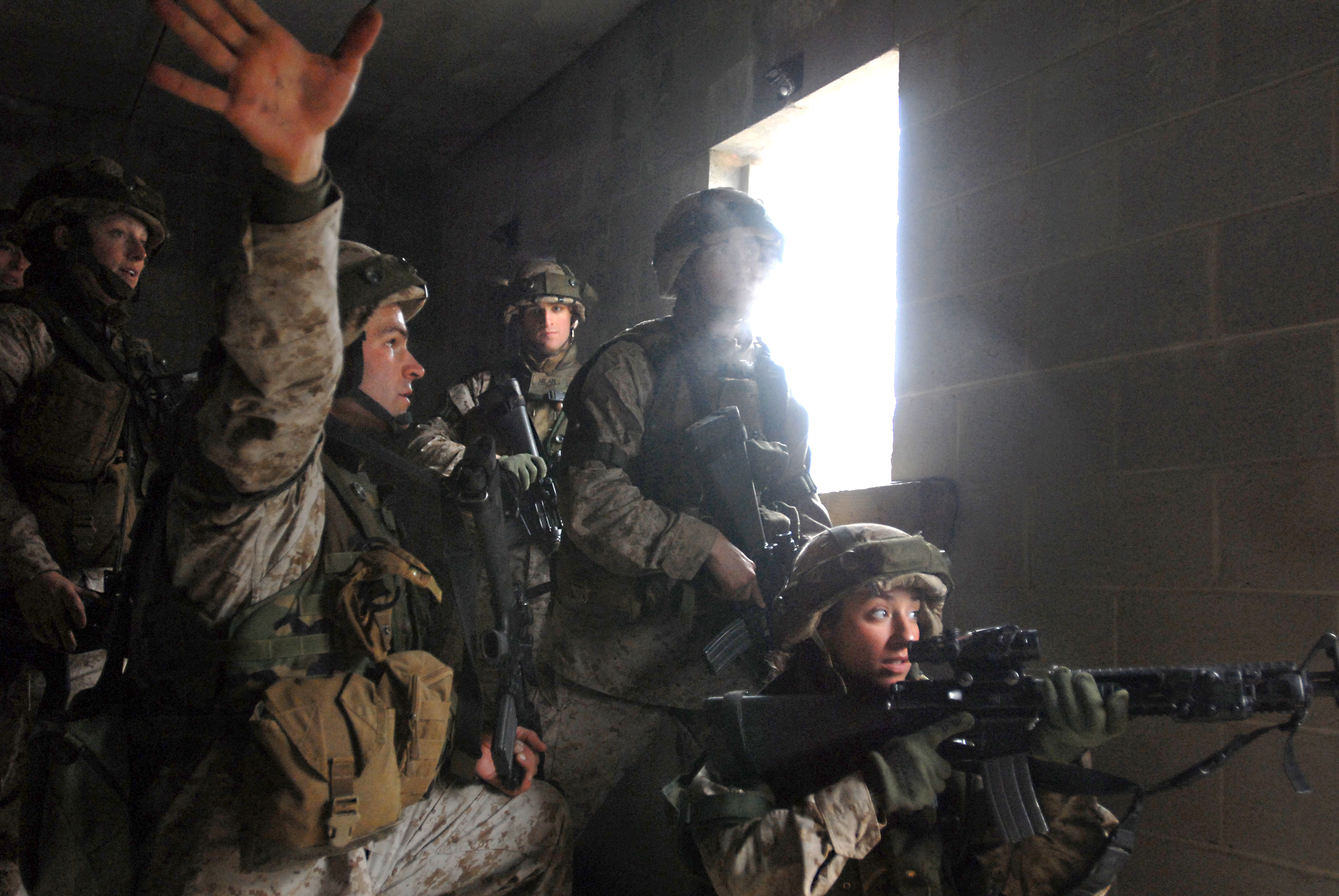 U.S. Marine lieutenants assigned to Gulf Company receive instructions ...