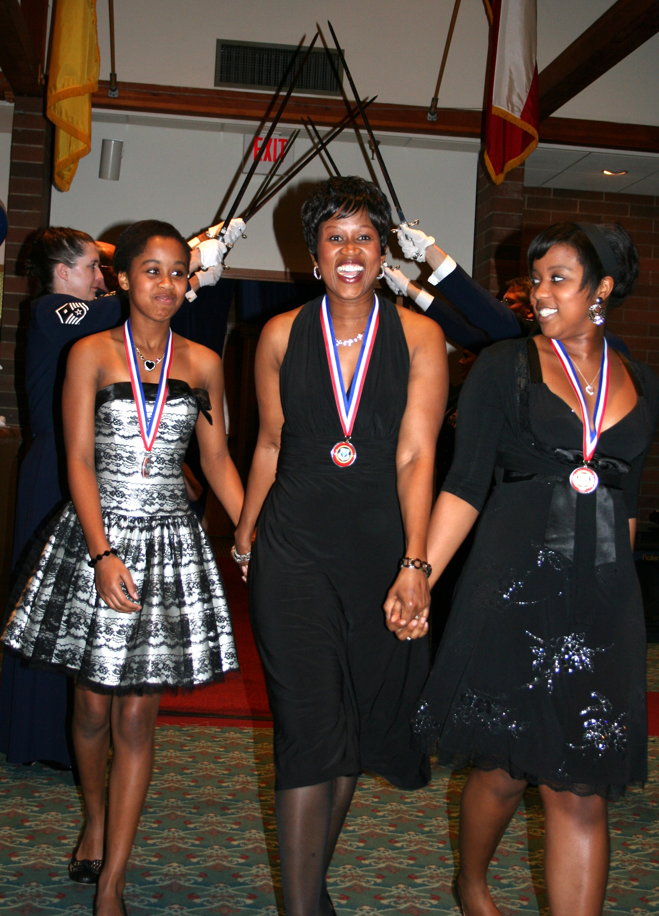 "First family" accepts award in lue of deployed Reservist