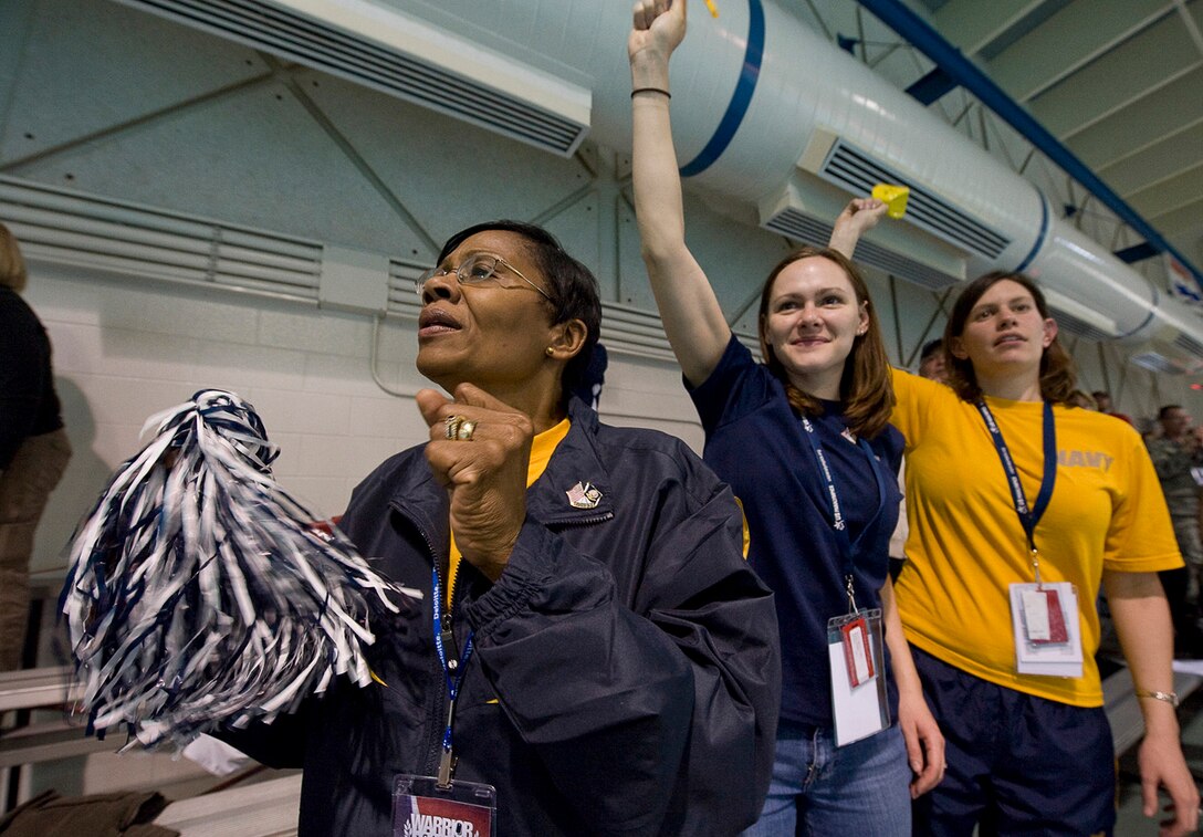 Navy fans cheer for their service members competing in the swim pre ...