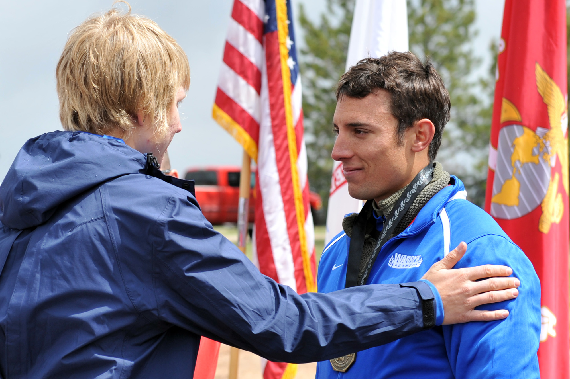 U.S. Air Force Staff Sgt. Marc Esposito receives a bronze medal in the ...