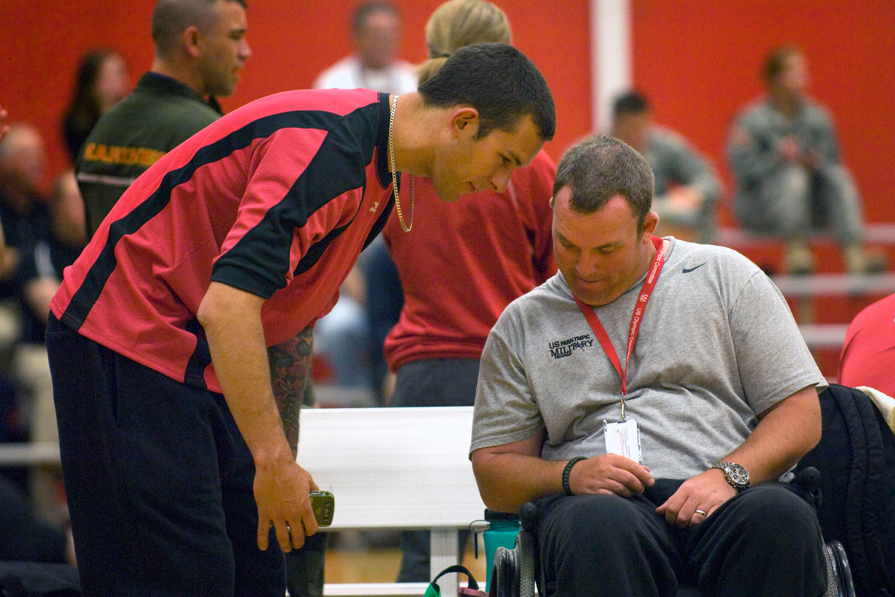 U.S. Paralympic athlete James Stuck talks on the sidelines of a sitting ...
