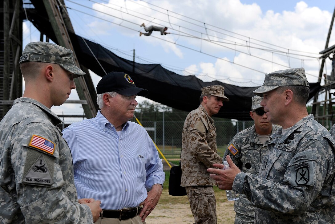 Defense Secretary Robert M. Gates talks with Army Major General Michael ...
