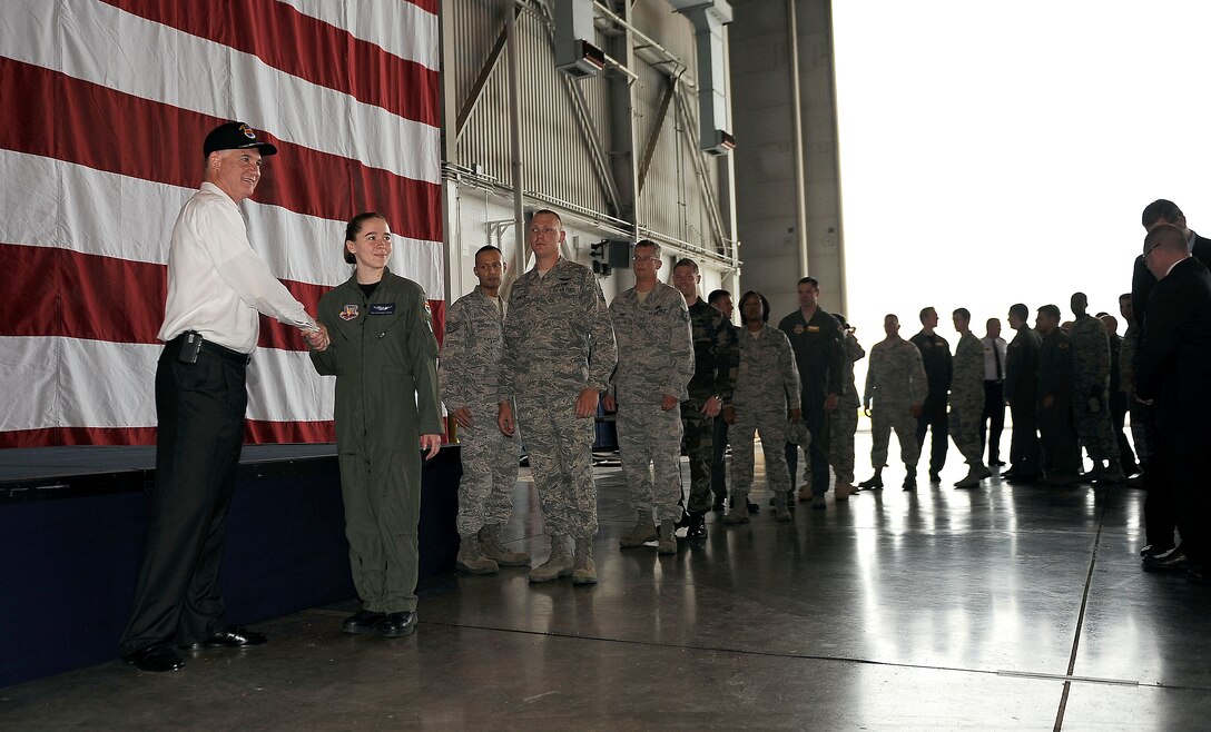 Deputy Defense Secretary William J. Lynn III talks with members of the ...
