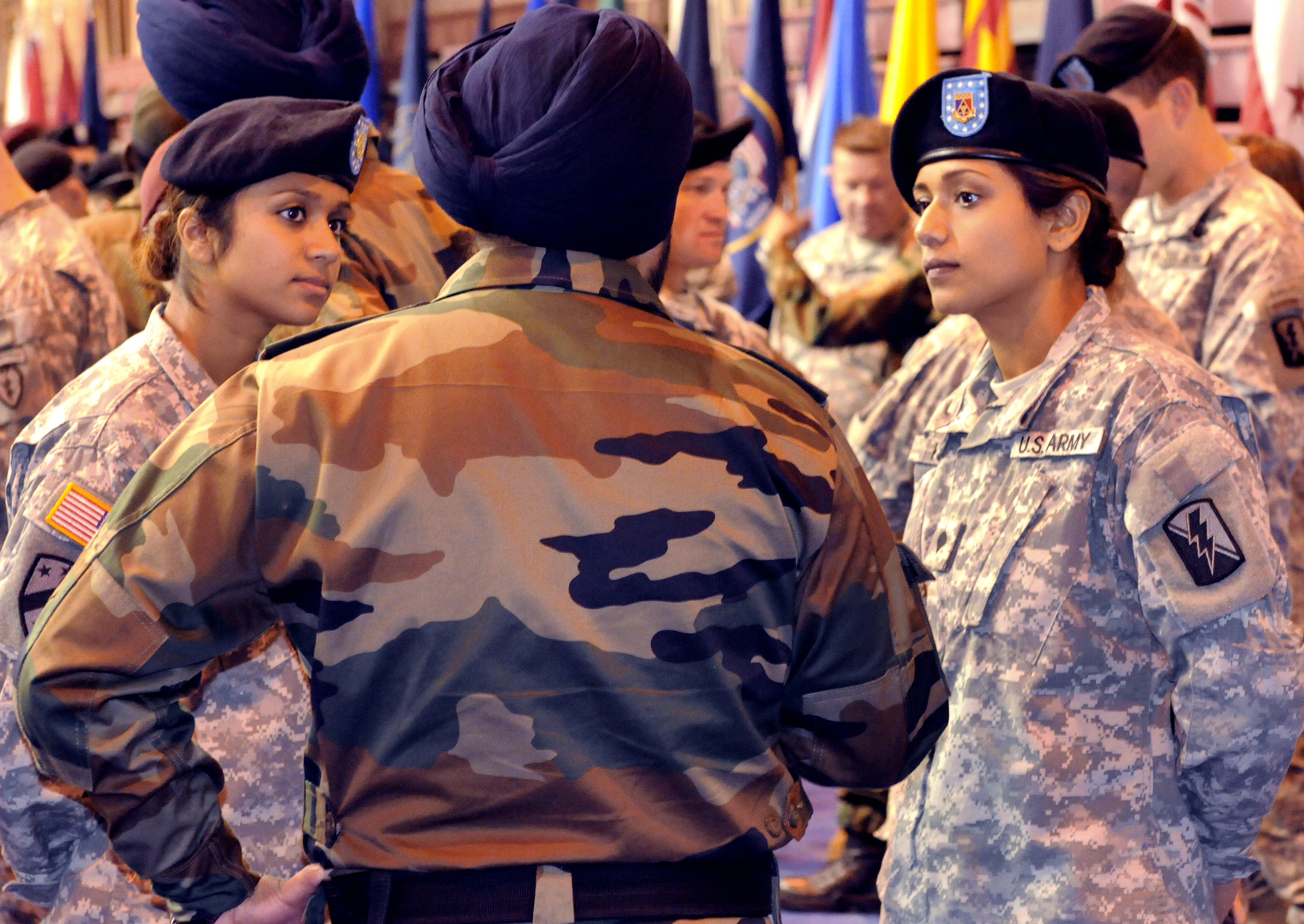 Indian-American sisters from the U.S. Army exchange common courtesies ...