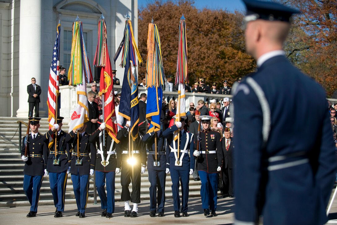 A joint Color Guard posts the colors during a Veterans Day ceremony at ...