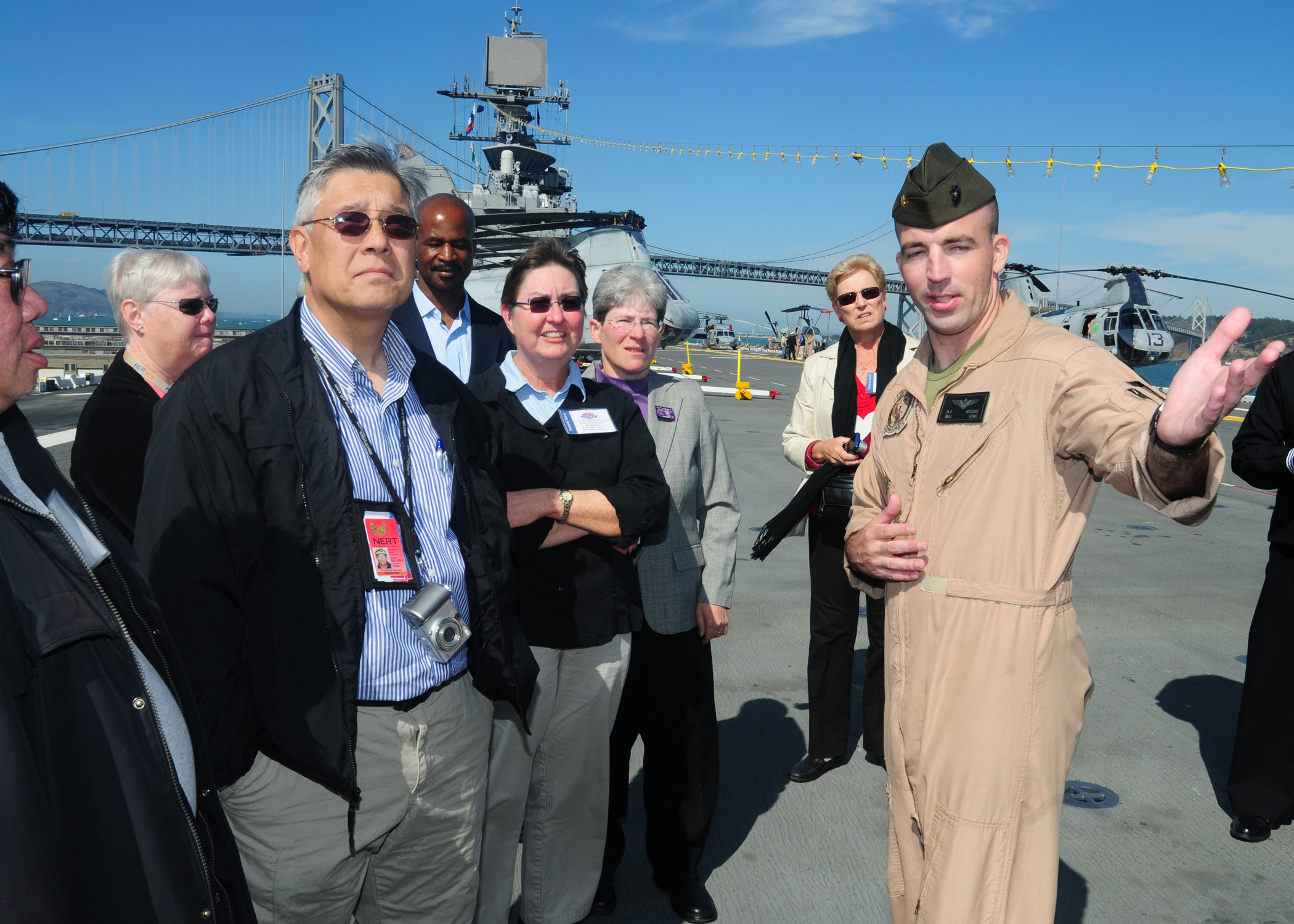 U.S. Marine Corps Maj. Dan Mcguire gives a tour of the Navy's newest ...