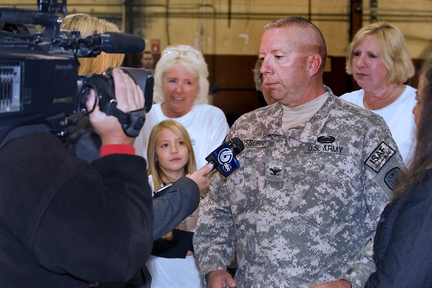U.S. Army Col. Michael J. Osburn talks to a local reporter at Stout ...