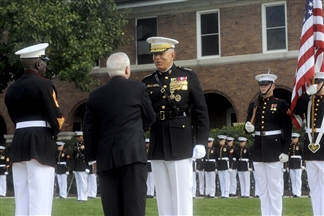 Secretary Gates presents an award to Gen. James T. Conway during a ...