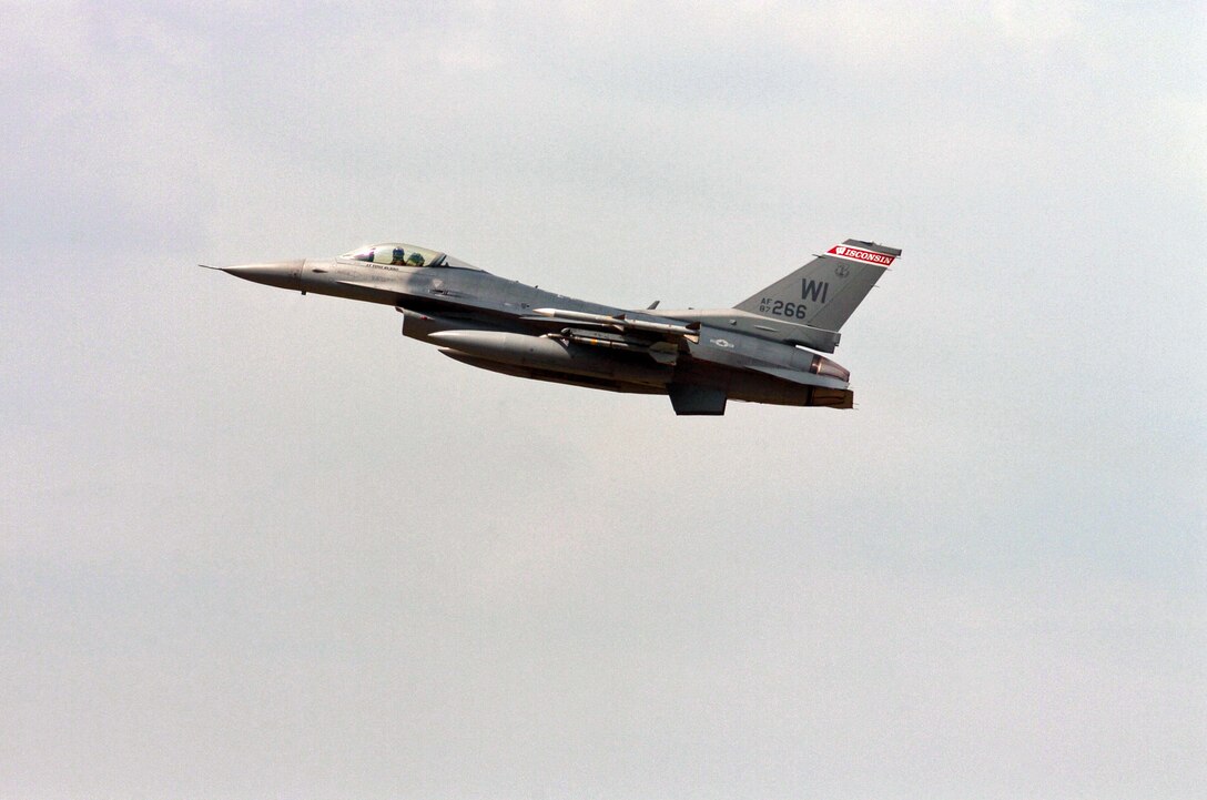 An F-16 Fighting Falcon flies over Volk Field, Wisconsin