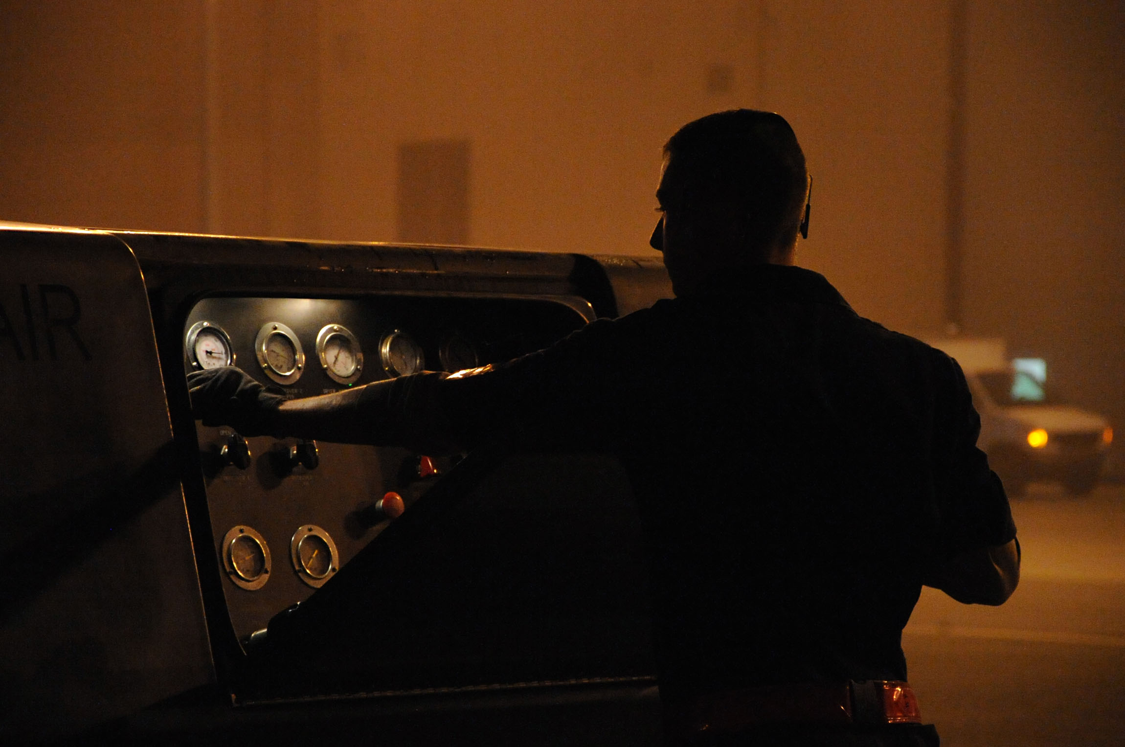 90th AMU Crew Chiefs Perform maintenance at night