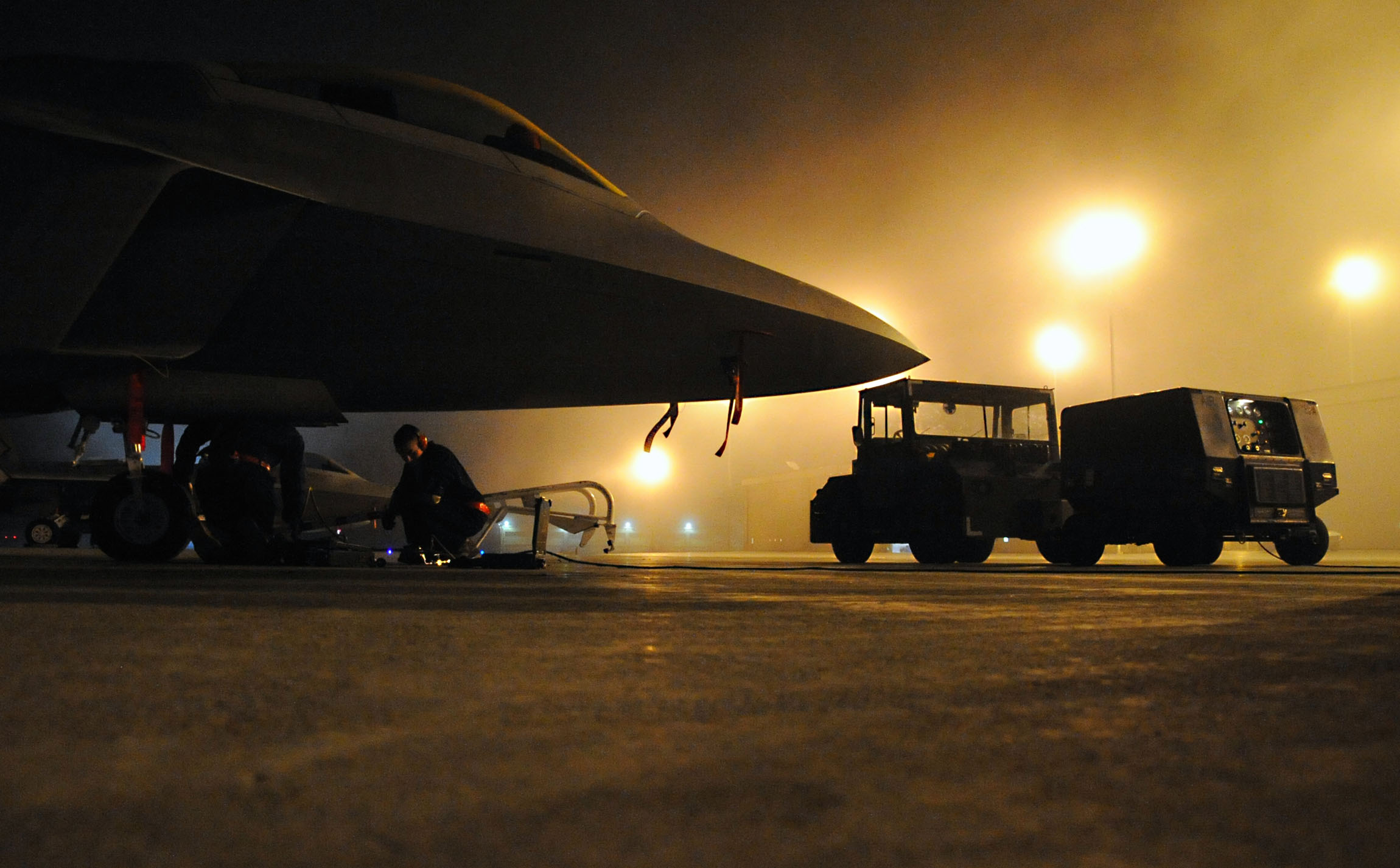 90th AMU Crew Chiefs Perform maintenance at night