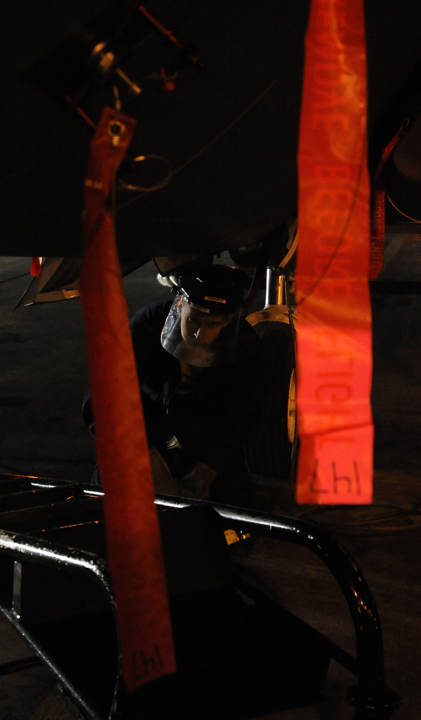 90th AMU Crew Chiefs Perform maintenance at night