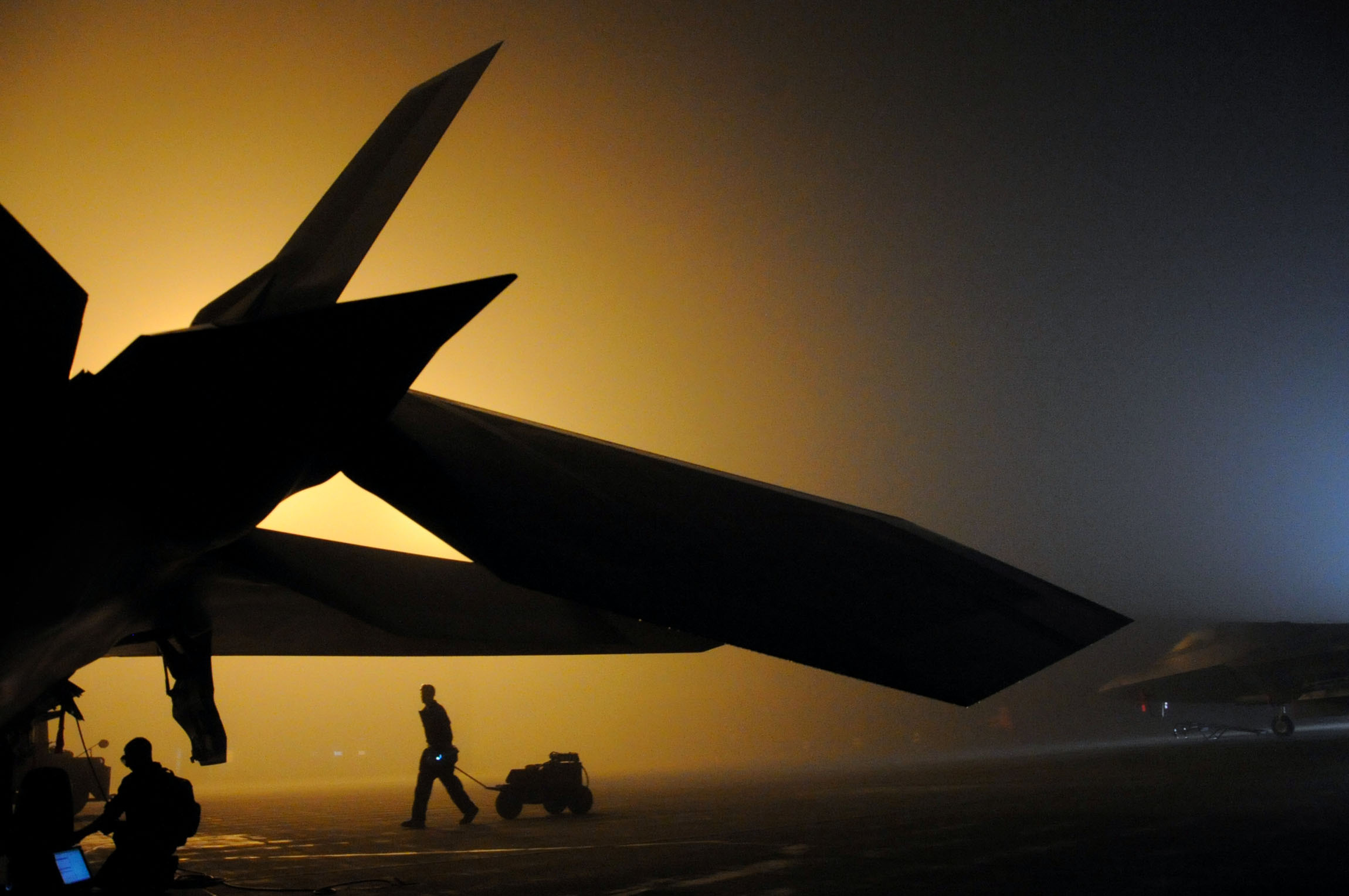 90th AMU Crew Chiefs Perform maintenance at night