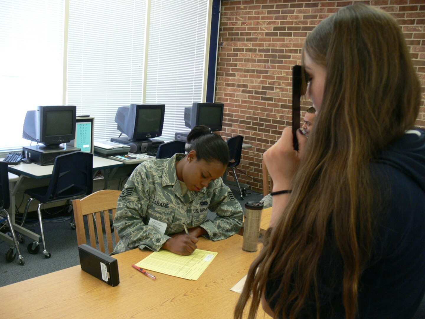Airmen adopt school; help with screenings > Peterson and Schriever ...