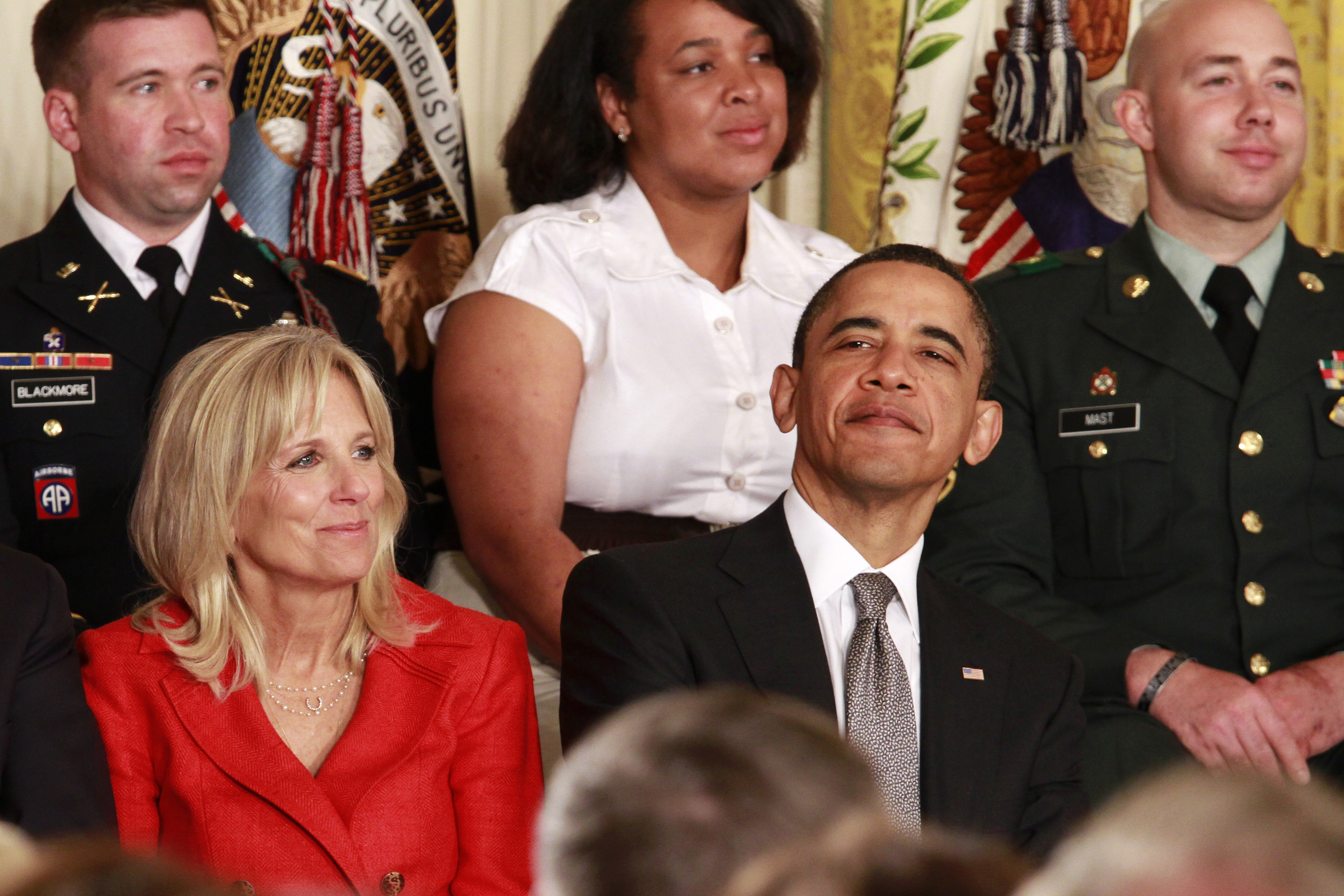President Barack Obama and Dr. Jill Biden listen as First Lady Michelle ...