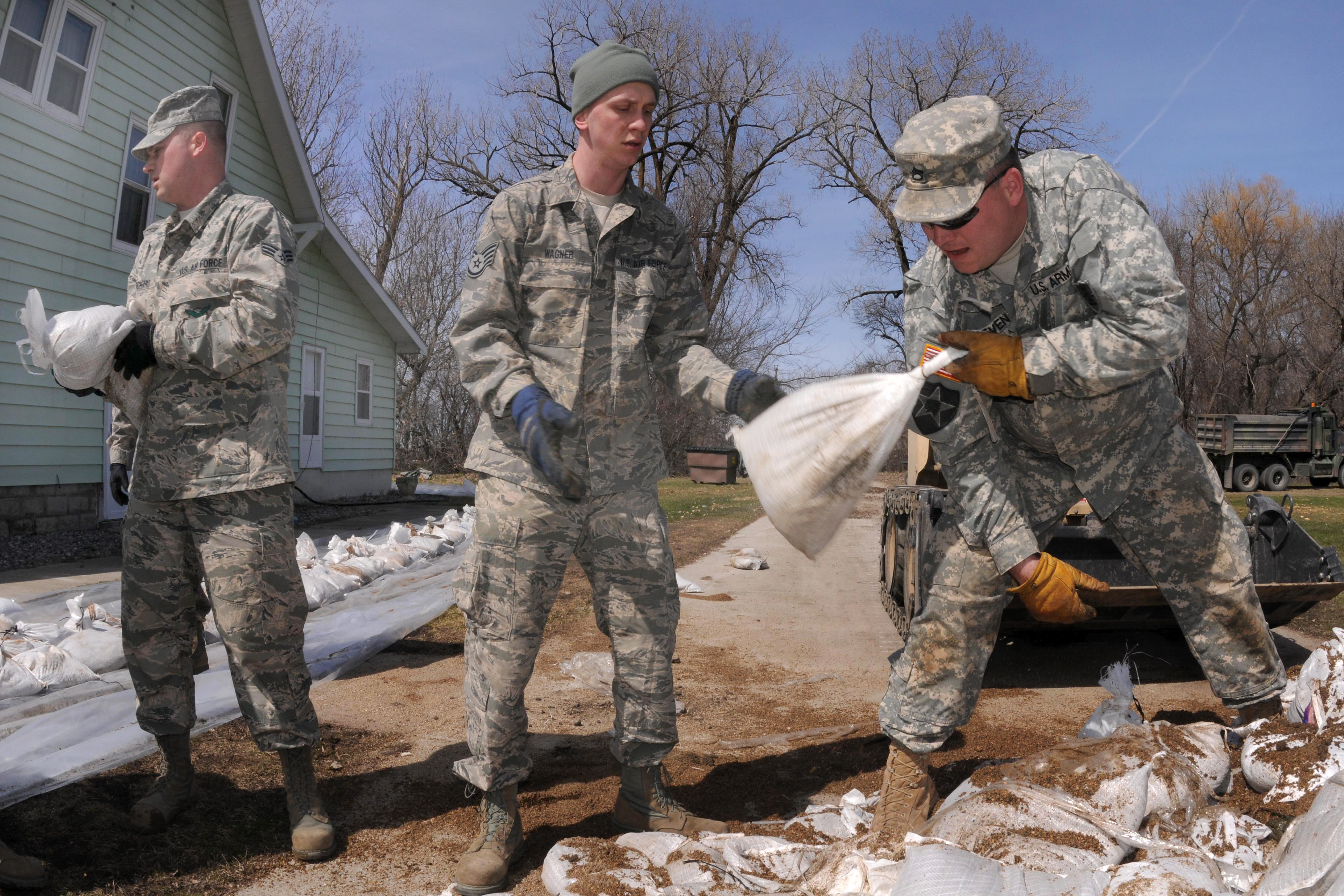 Right to left, Army Staff Sgt. Christopher Kleven, Air Force Staff Sgt ...