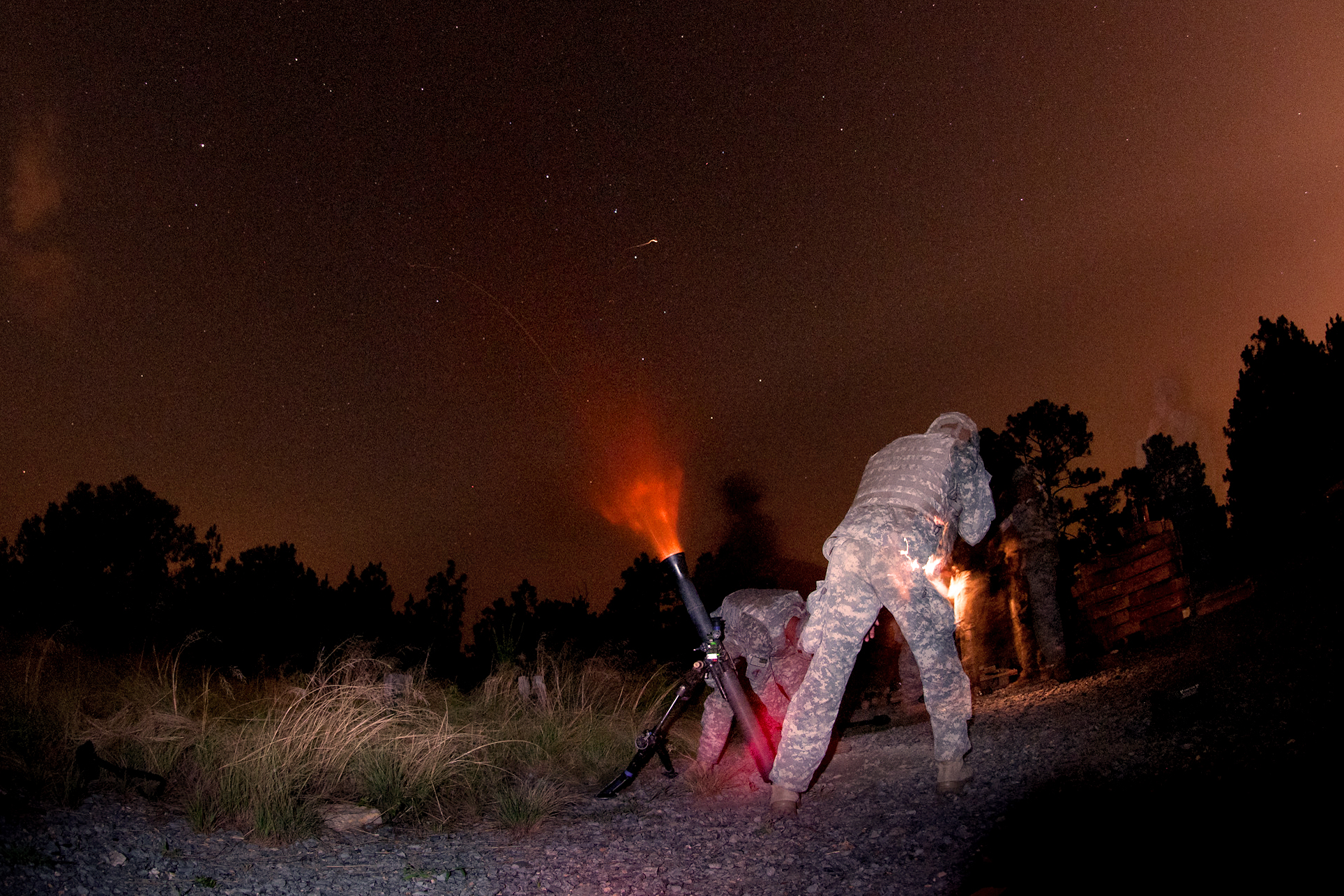 Army mortarmen fire an M224 60mm mortar during field training on Fort ...
