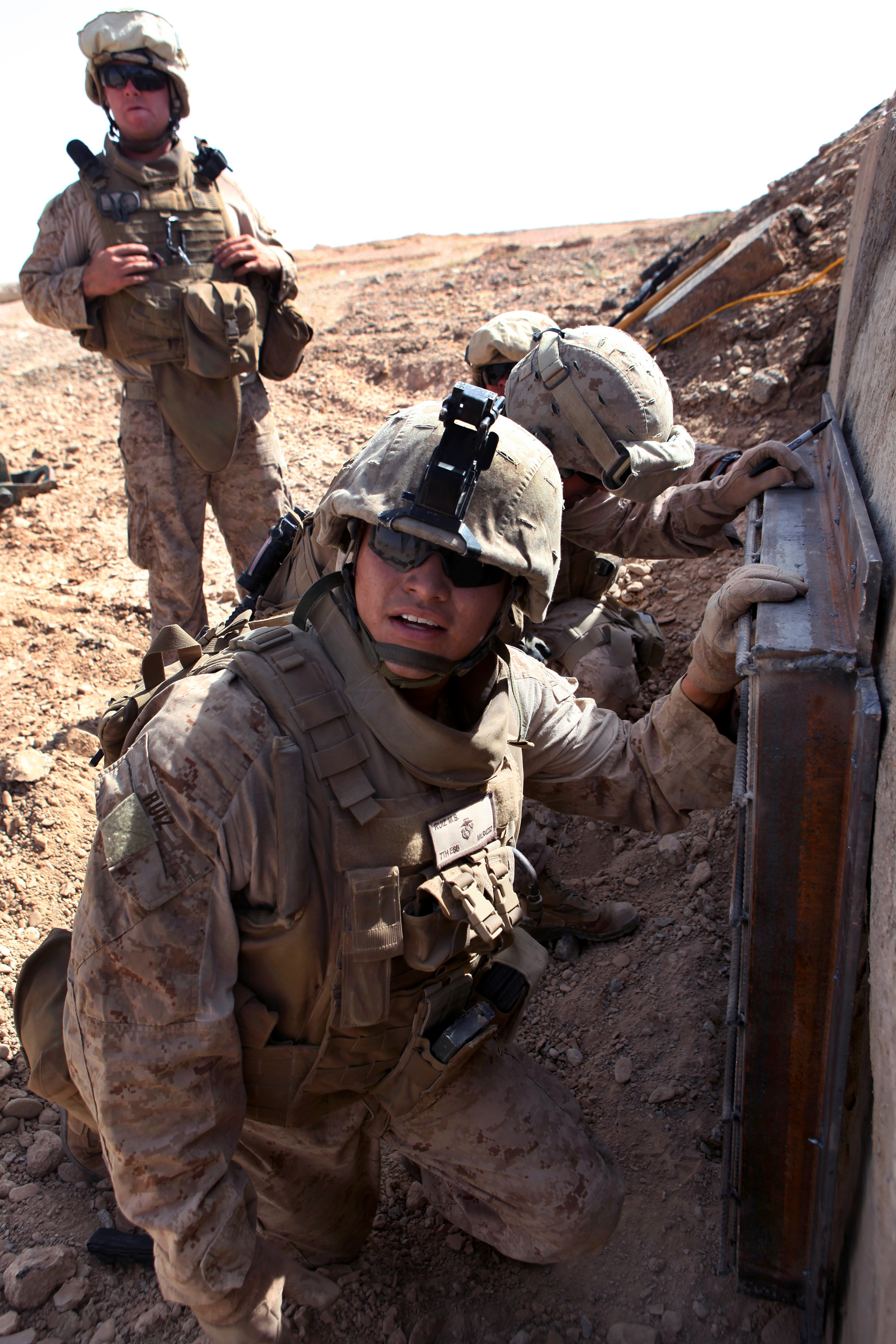 U.S. Marine Sgt. Moses S. Ruiz, front, Sgt. James S. Coleman, middle ...