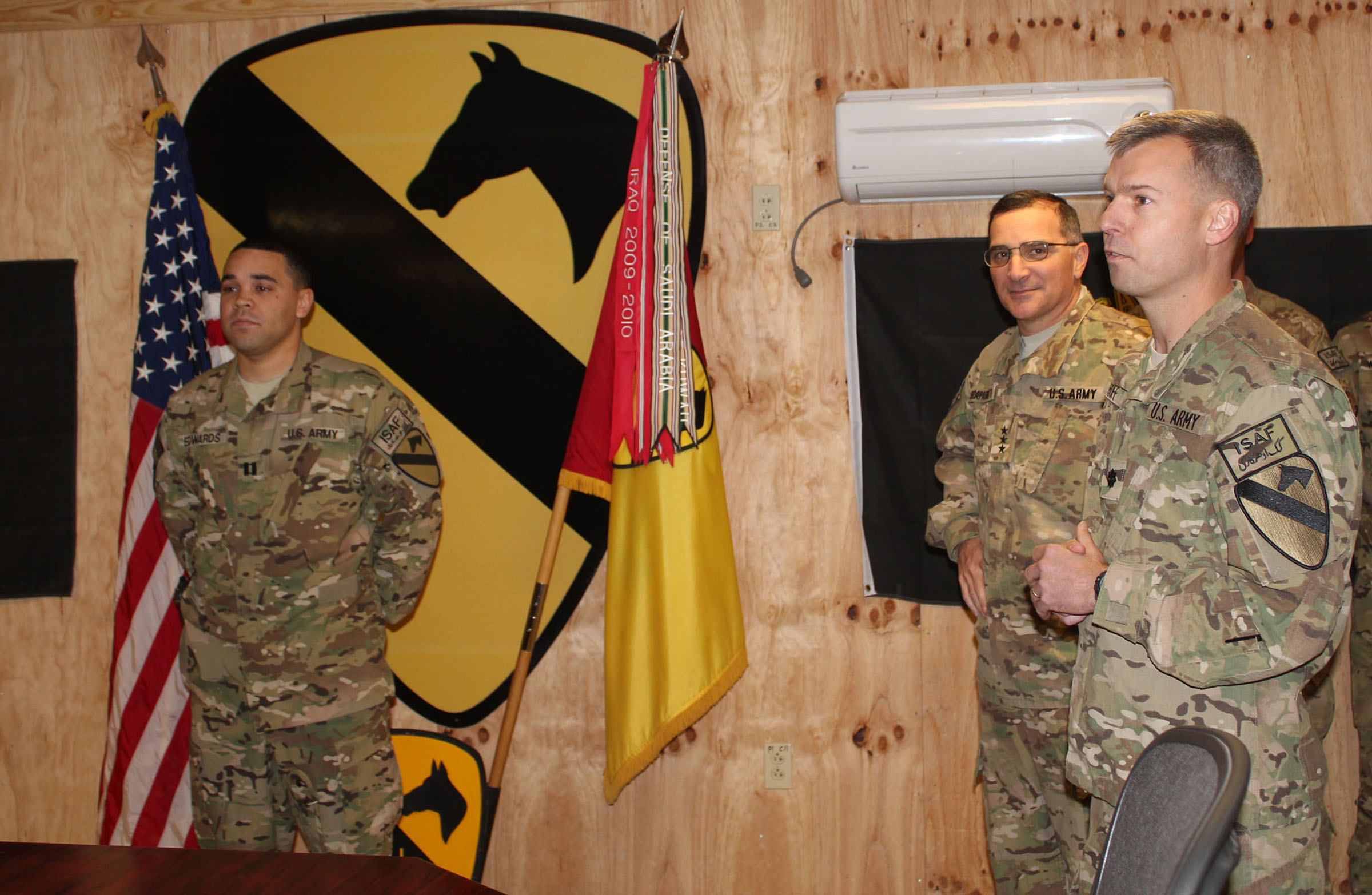 Army Capt. Dennis Edwards, left, an operations officer assigned to Task ...