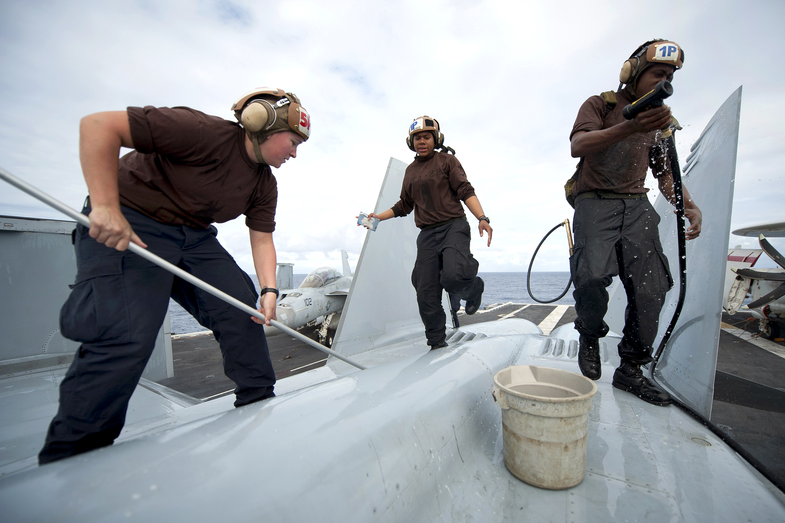 U.S. Navy Seaman Katie Griffith, Petty Officer 3rd Class Veronica ...