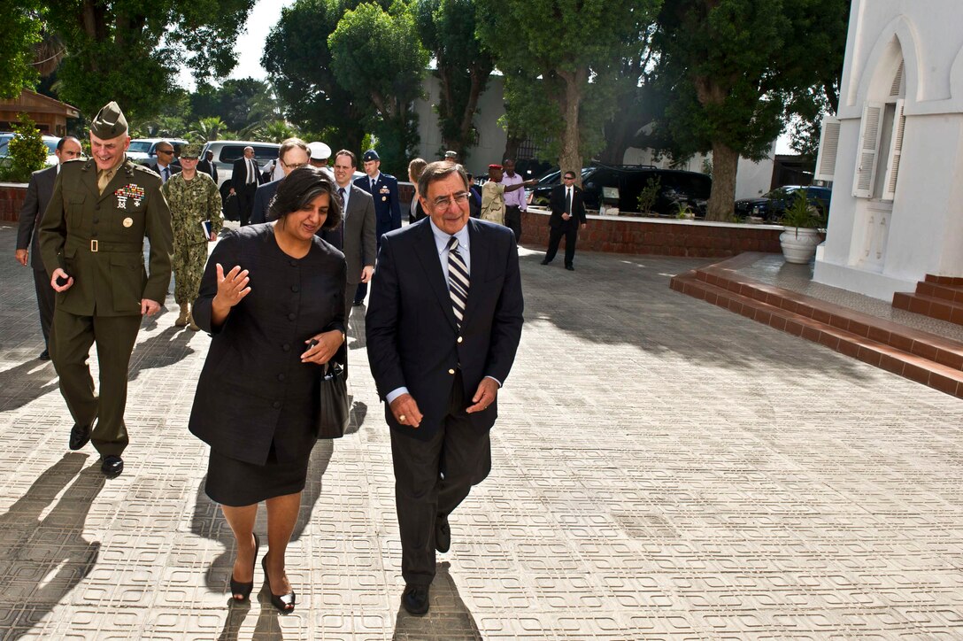 U.S. Defense Secretary Leon E. Panetta, right, walks with U.S ...