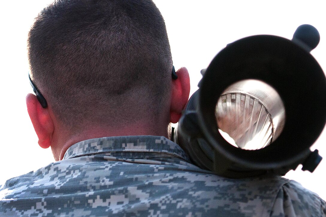 A paratrooper shoulders a Carl Gustav M3 84mm recoilless rifle during a ...