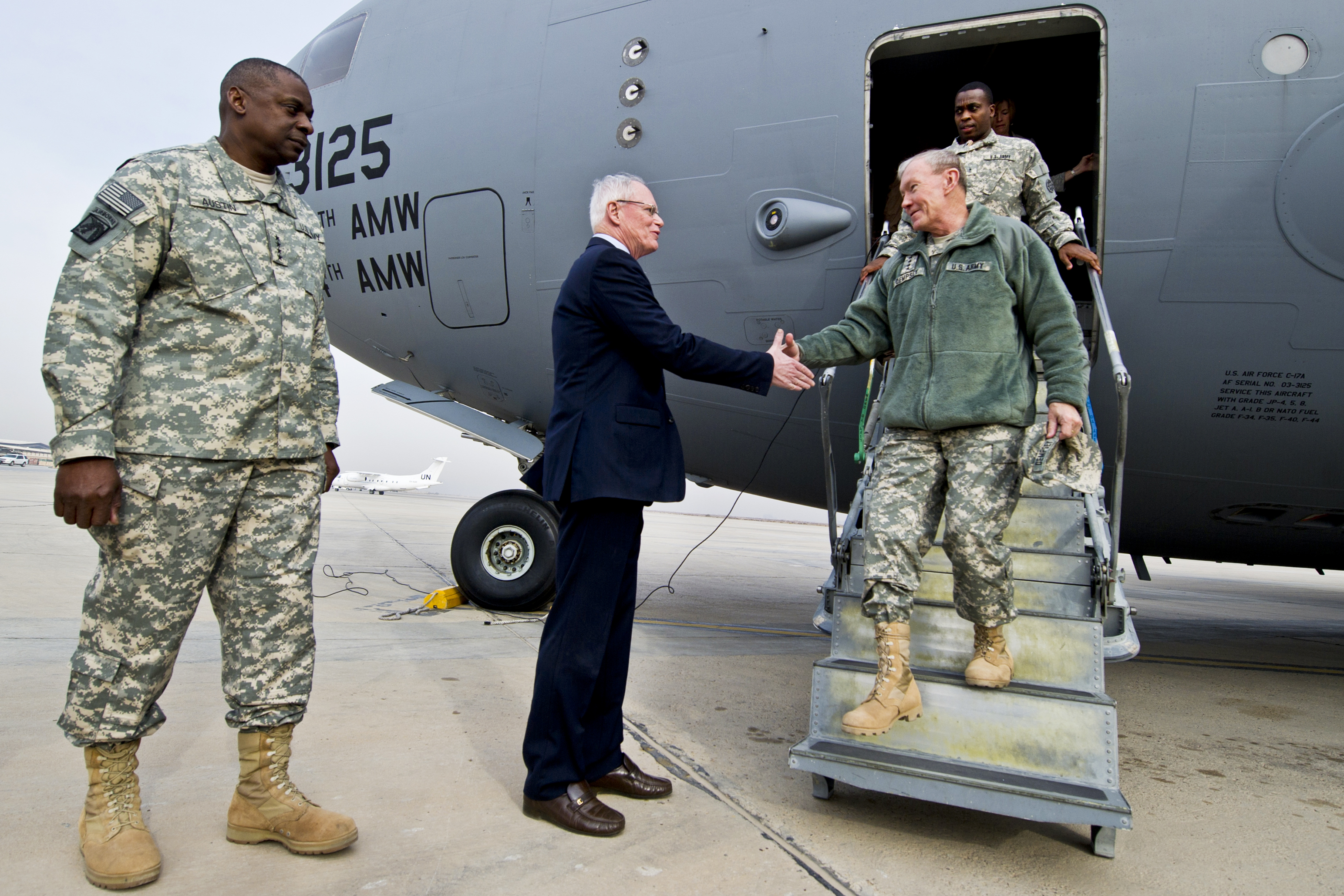 U.S. Ambassador to Iraq James F. Jeffrey greets U.S. Army Gen. Martin E ...