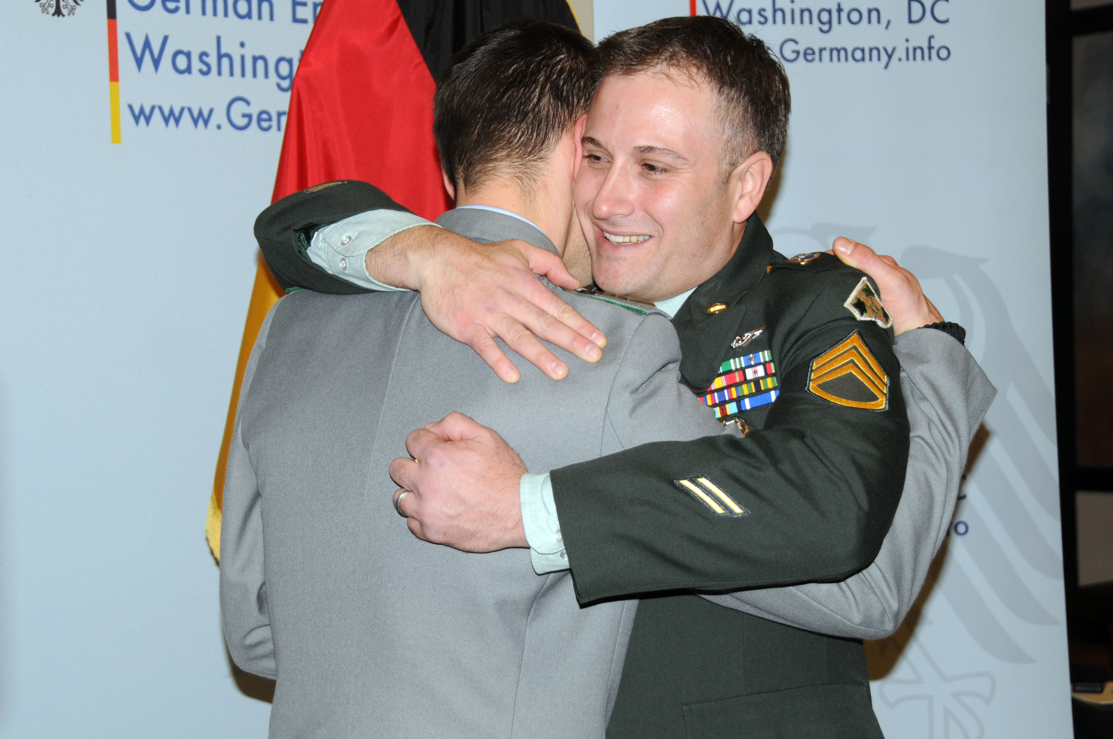 U.S. Army Staff Sgt. Peter Woken and German army Cpl. Tim Focken ...