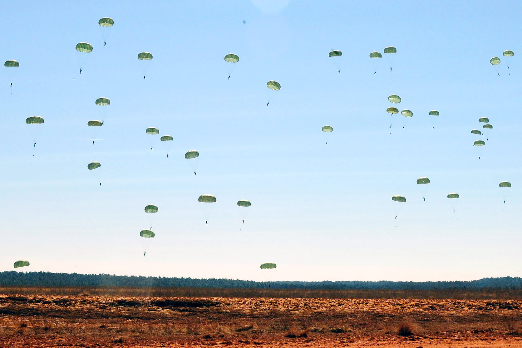 U.S. Army paratroopers parachute onto Sicily Drop Zone on Fort Bragg, N ...
